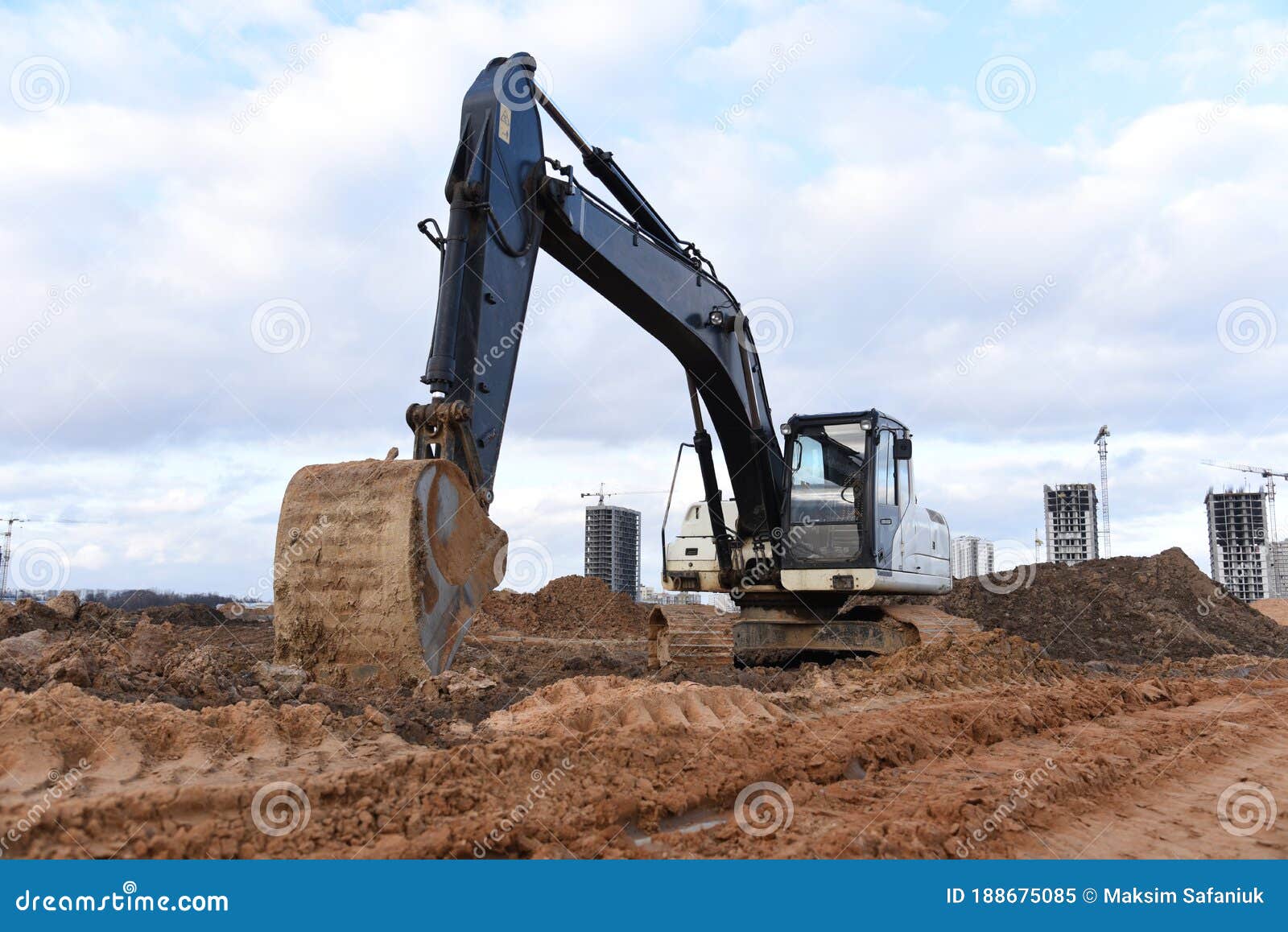 Black and White Excavator during Earthworks at Construction Site ...