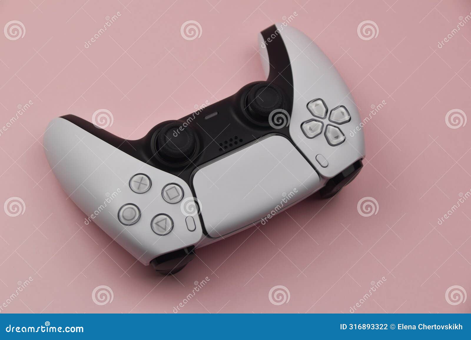 Black and White Game Controllers on Pink Background Editorial ...