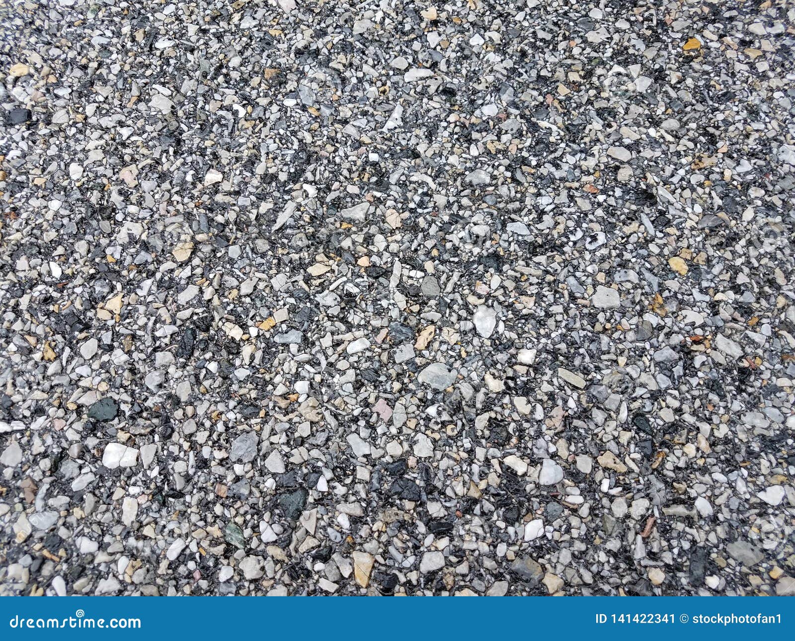 Black, White, and Grey Stones or Rocks on Asphalt Stock Image - Image ...