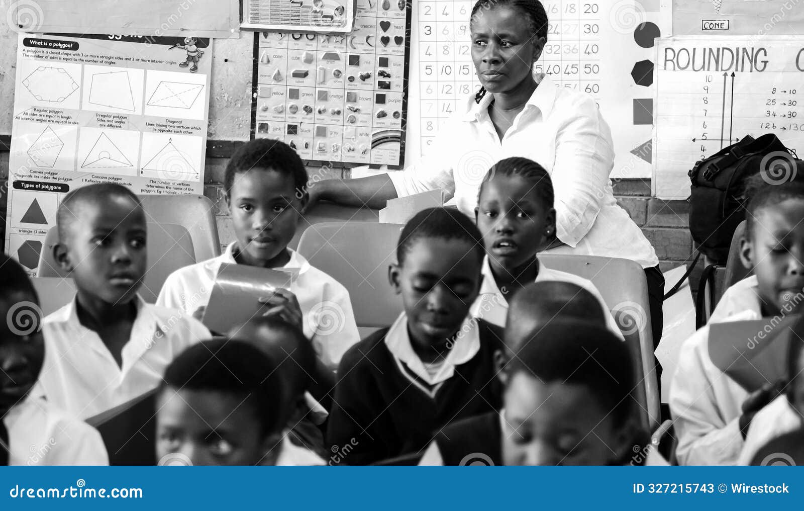 Teacher In African Robe At An Opening Of A Primary School With A German ...