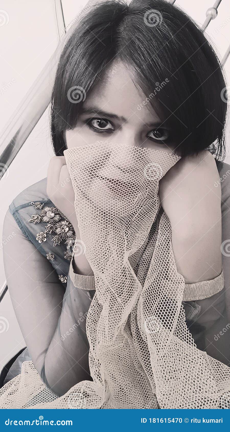 Black and White Image of a Girl Whose Half Face is Covered with Net ...