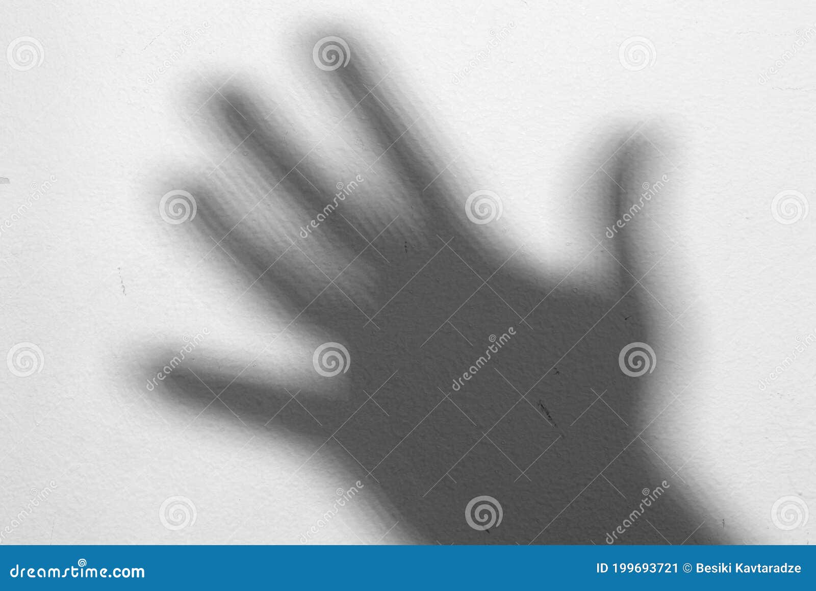 A Black and White Image of a Man`s Hand Hadow on the Wall. Stock Image ...