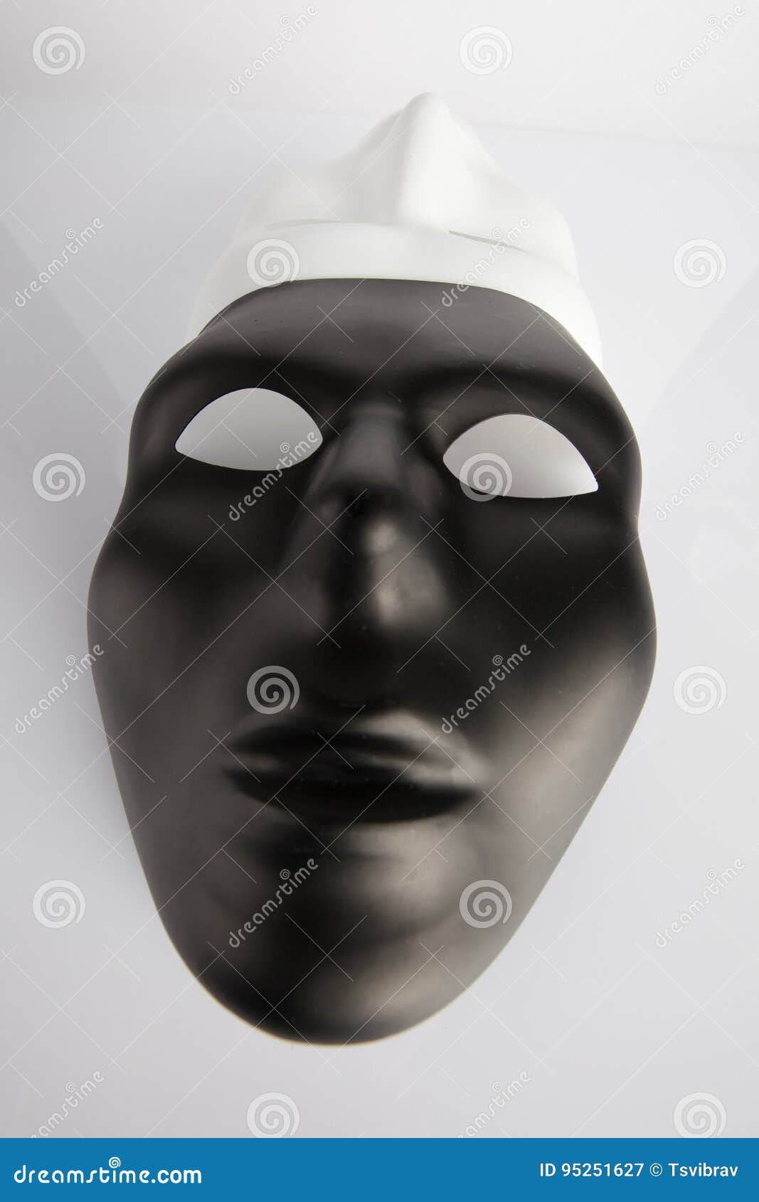 Black and White Masks Joined on White Reflective Background. Wid Stock ...