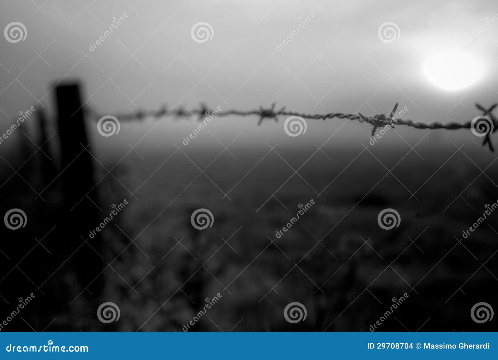Sunrise Over a Barbed Wire Fence Stock Photo - Image of protection ...