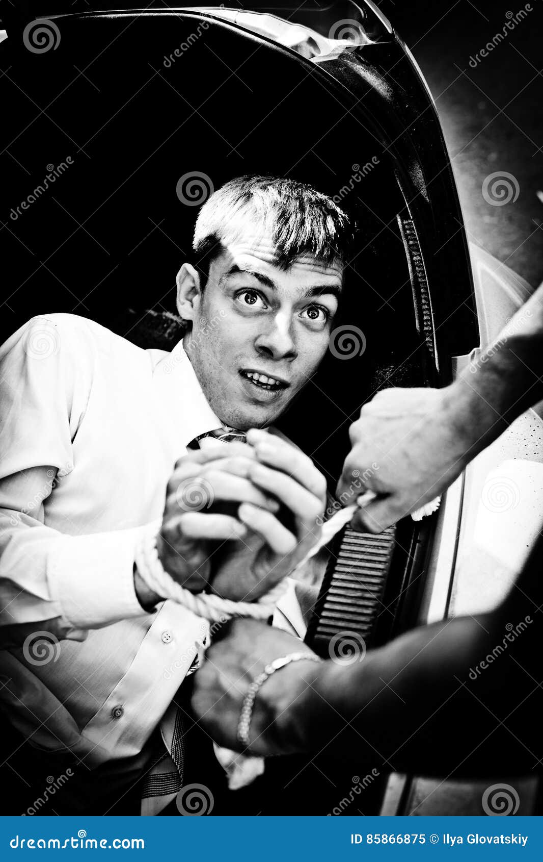 Black and White Photo of Man in Trunk Stock Image - Image of city, bind ...