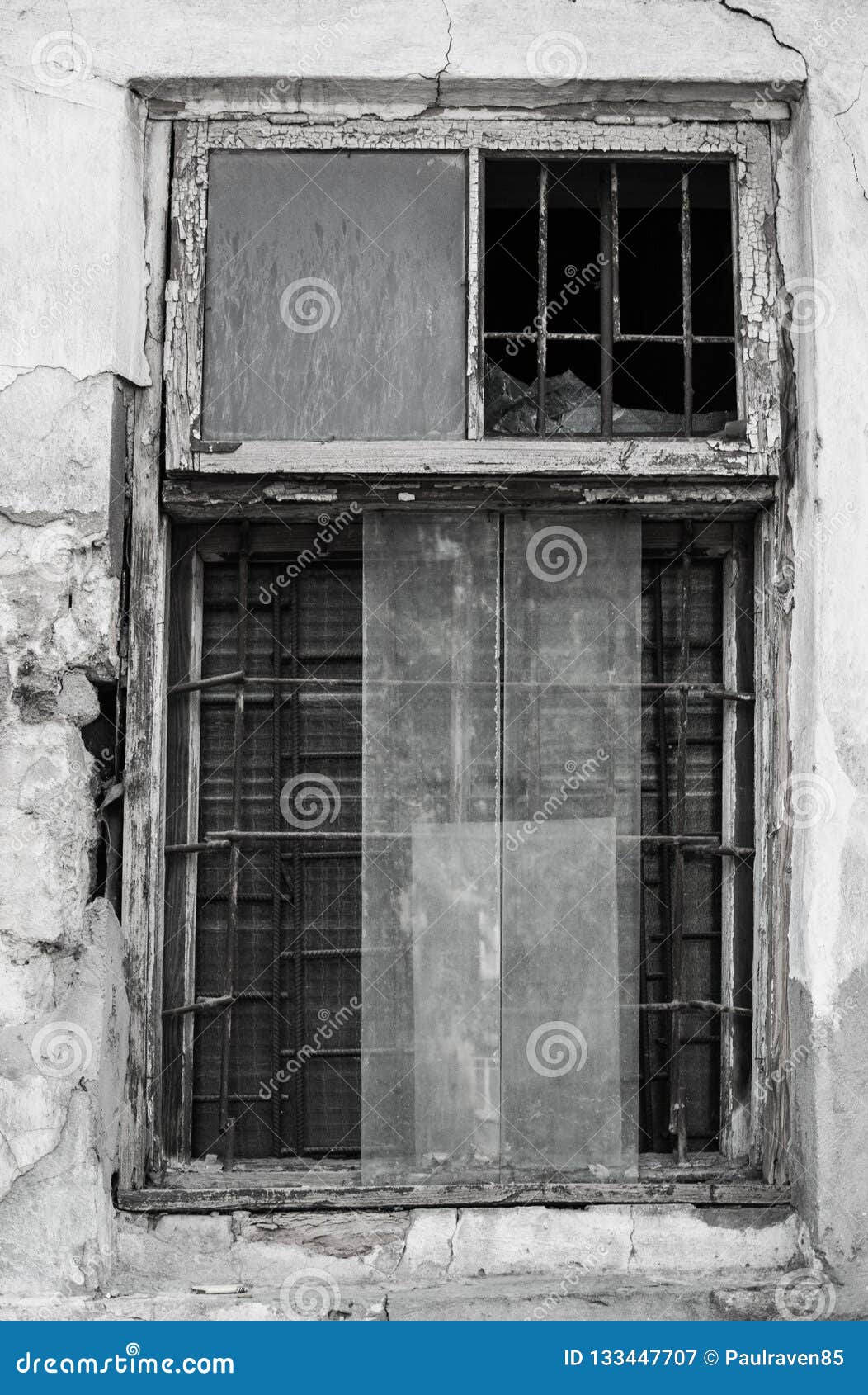 Black and White Photo of an Window Frame with Partially Broken Windows ...