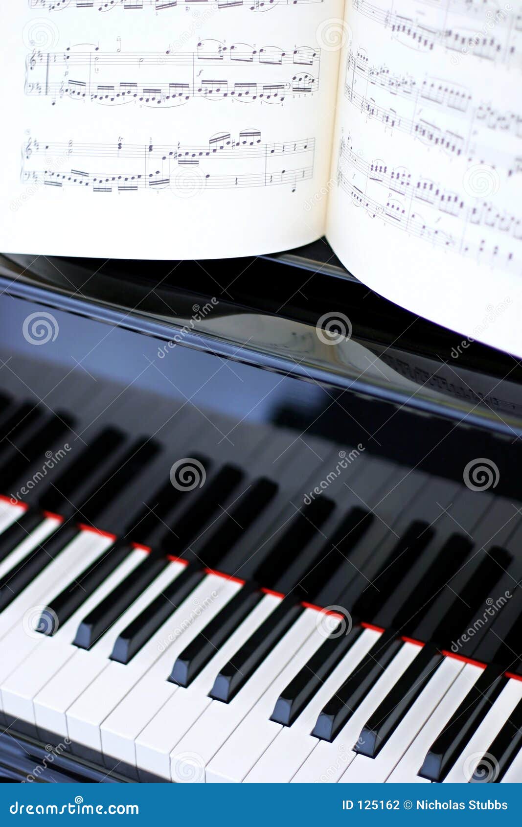 Black and White Piano Keys and Sheet Music Stock Photo - Image of ivory ...
