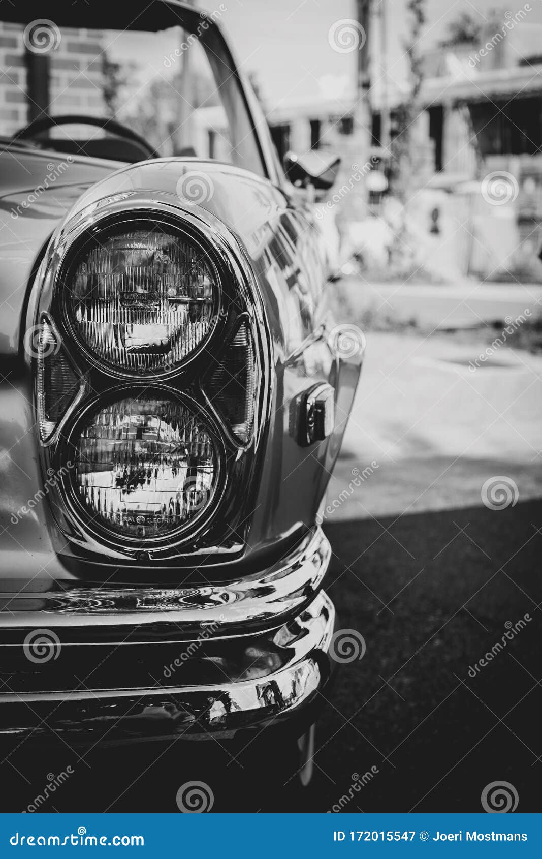A Black and White Portrait of the Front Right Headlights of an Old ...