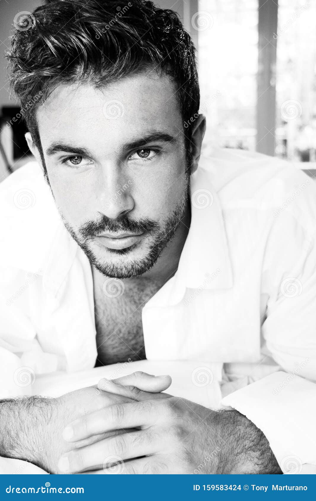 Black And White Portrait Of Handsome Man With Beard And Open White