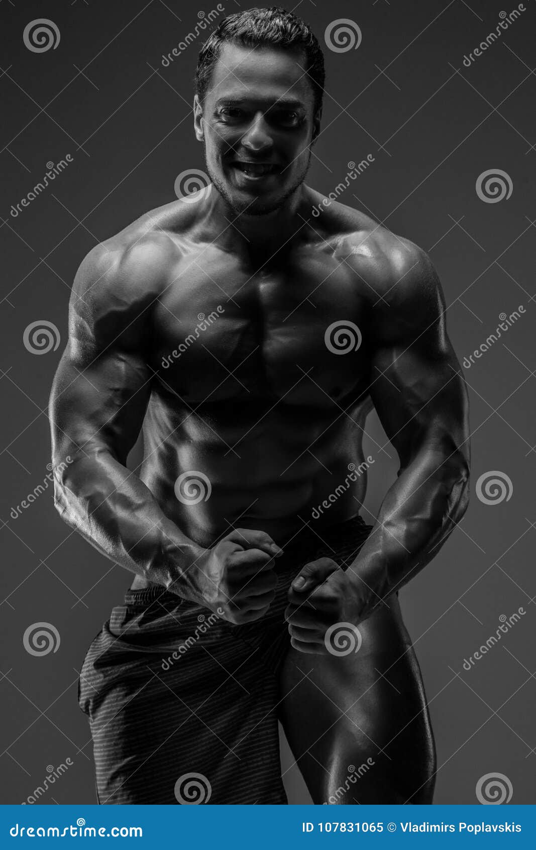Awesome Muscular Guy Posing in Studio. Stock Image - Image of ...