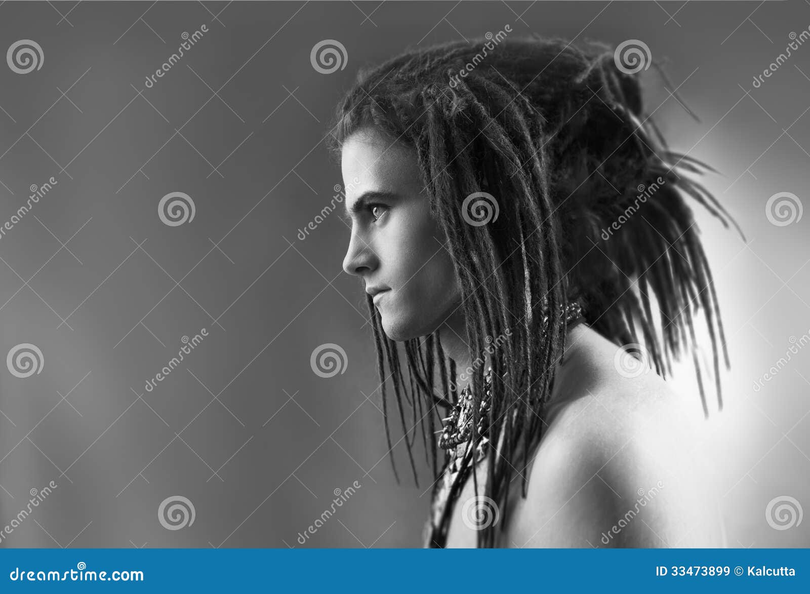 Black And White Profile Portrait Of A Young Man With Dreadlocks Stock