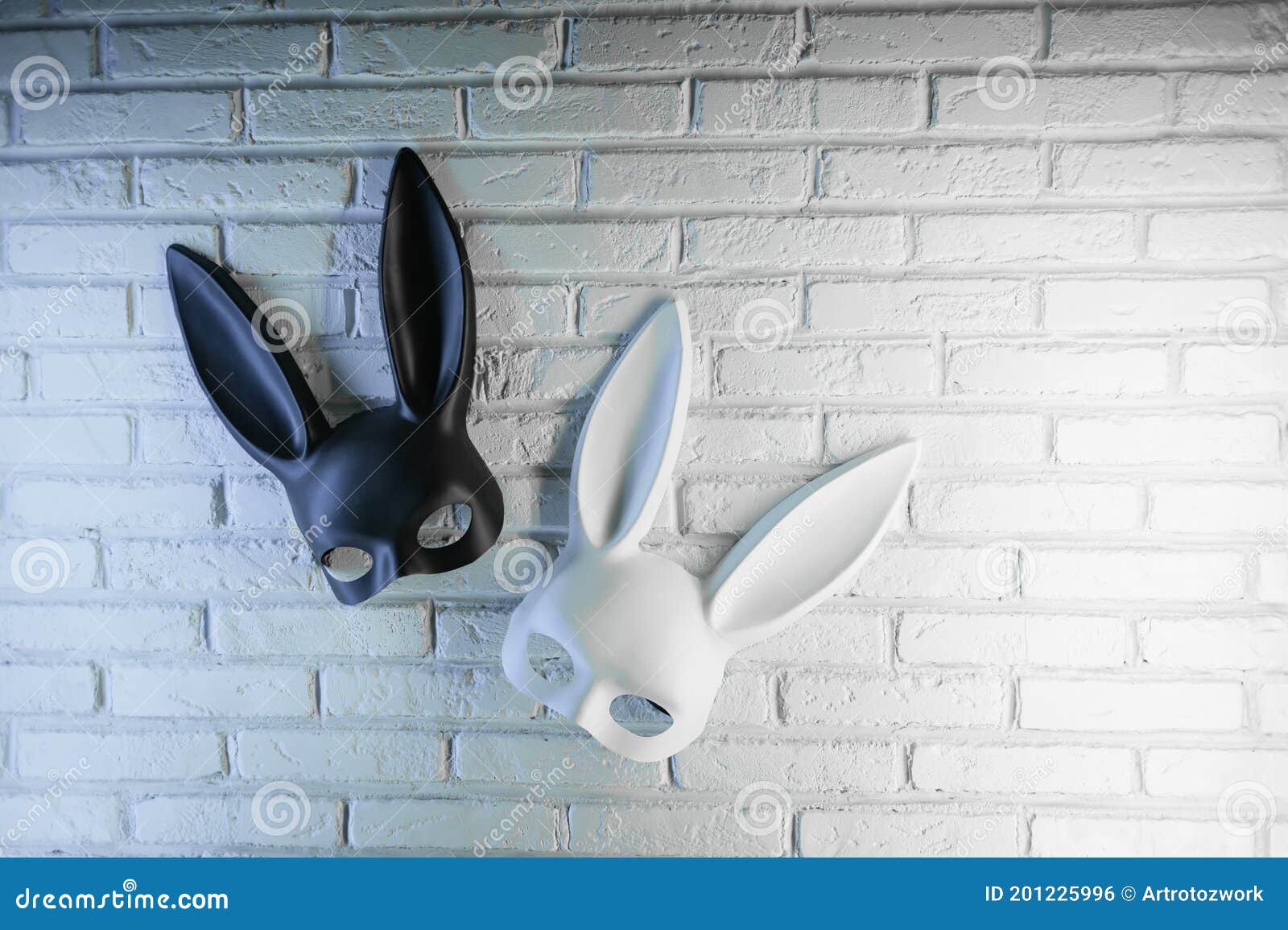 Black and White Rabbit Mask on White Texture Wall Background Stock ...