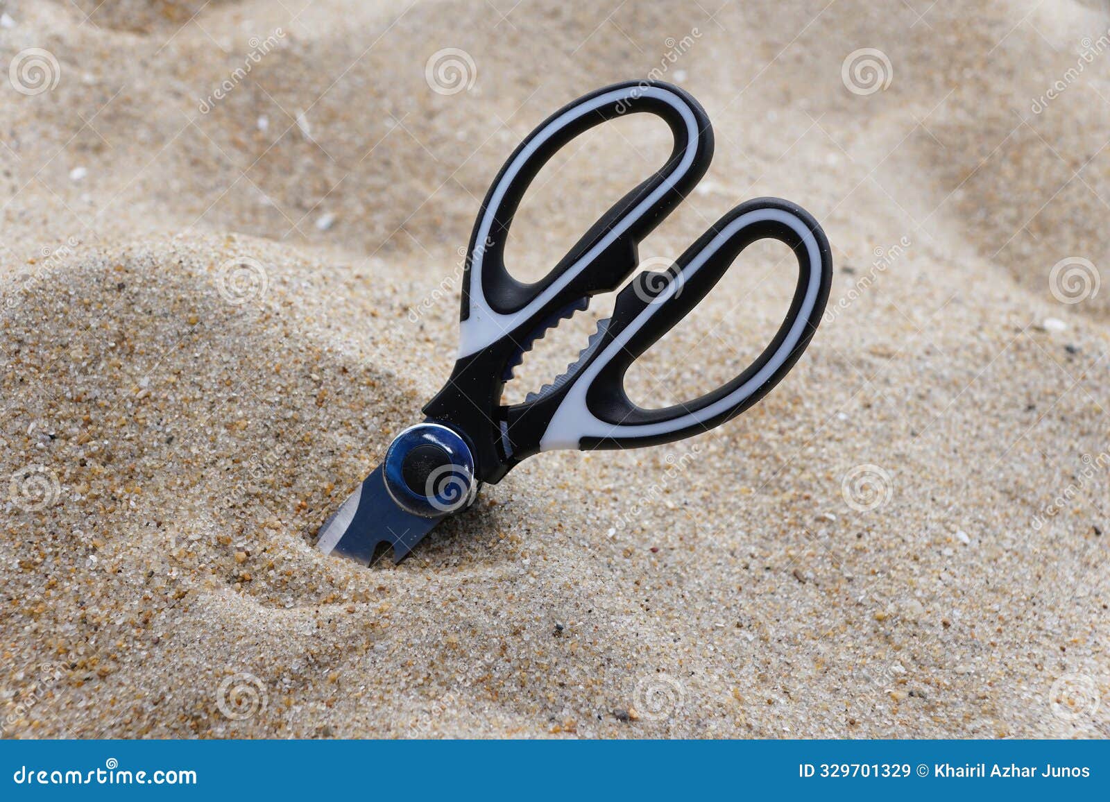 A Black and White Scissors Half-buried in the Sand Stock Image - Image ...