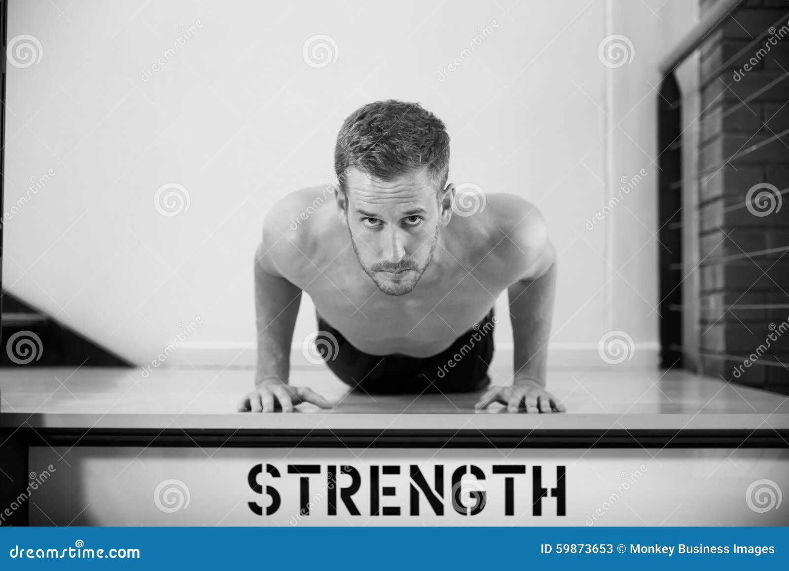 Black and White Shot of Man in Gym Doing Press-Ups Stock Image - Image ...