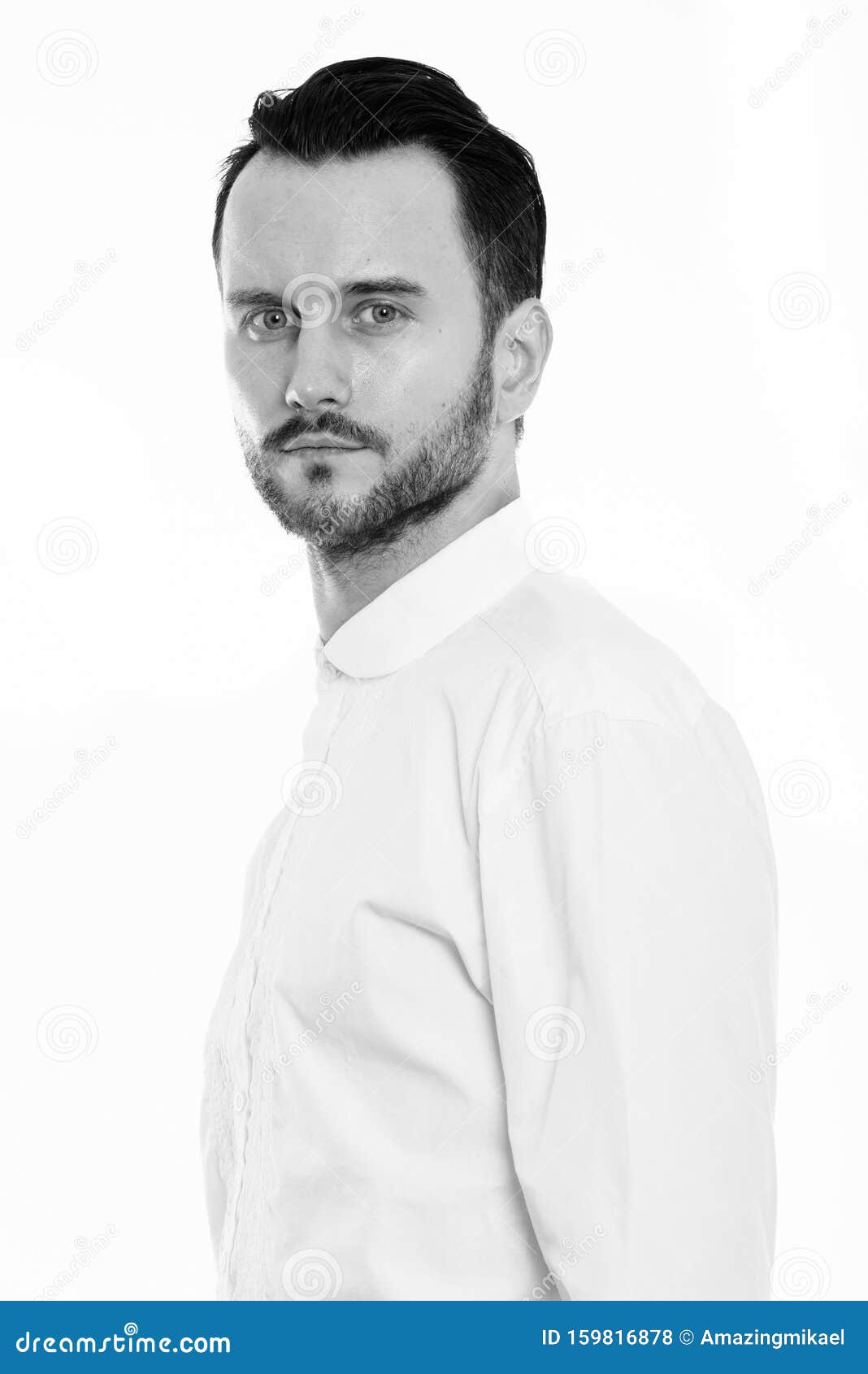 Studio Shot of Young Man Looking Over Shoulder Stock Photo - Image of ...
