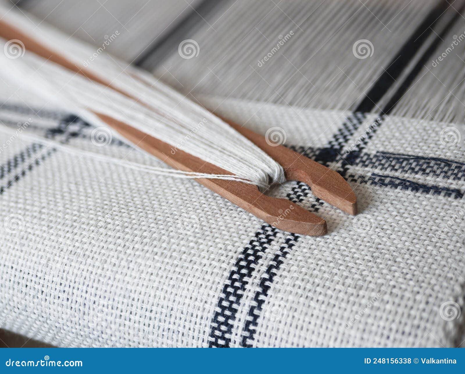 Black and White Weaving Project. Wooden Shuttle with Thread on the ...