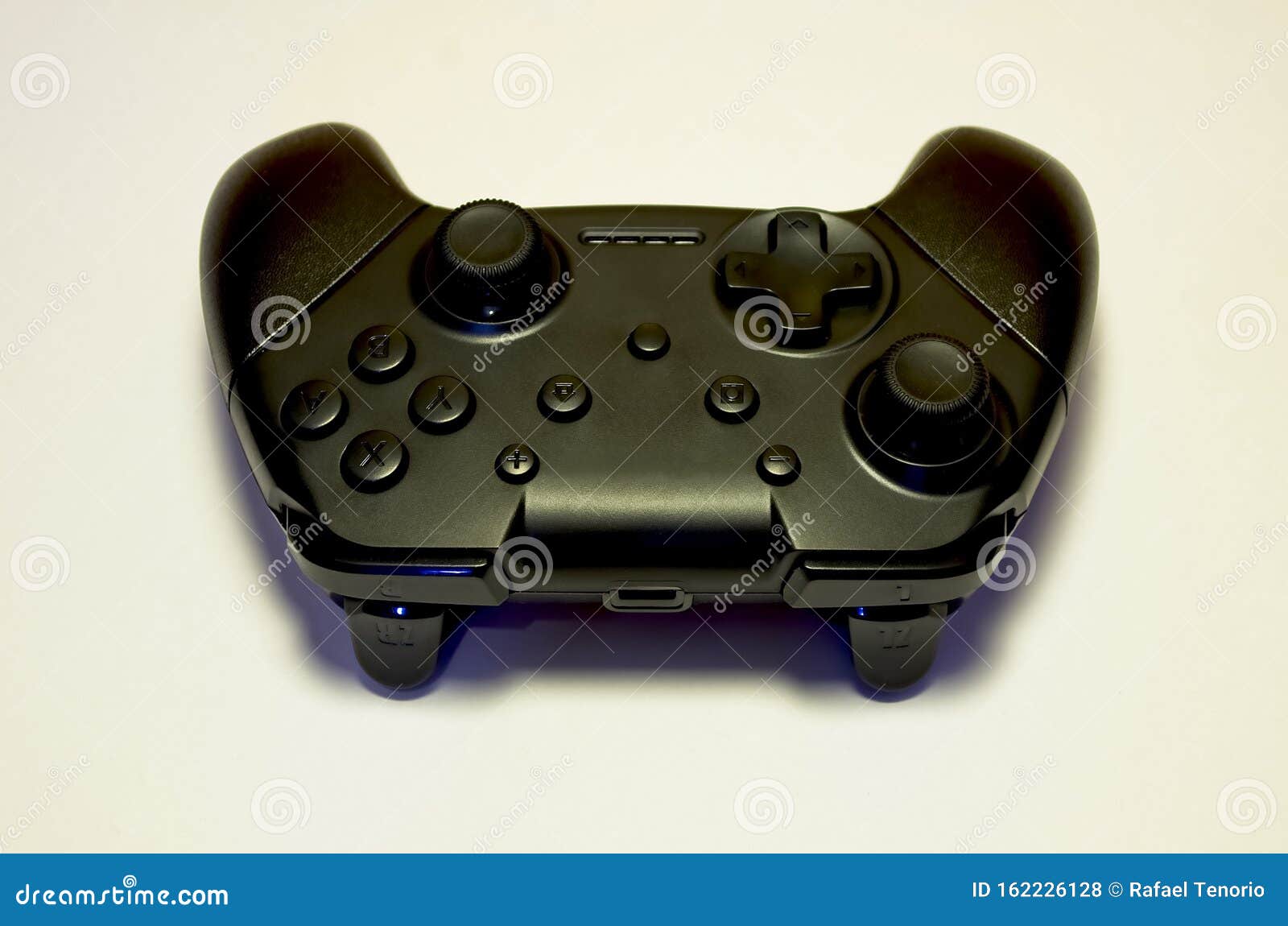 Black Wireless Game Controller on White Background Stock Photo - Image ...