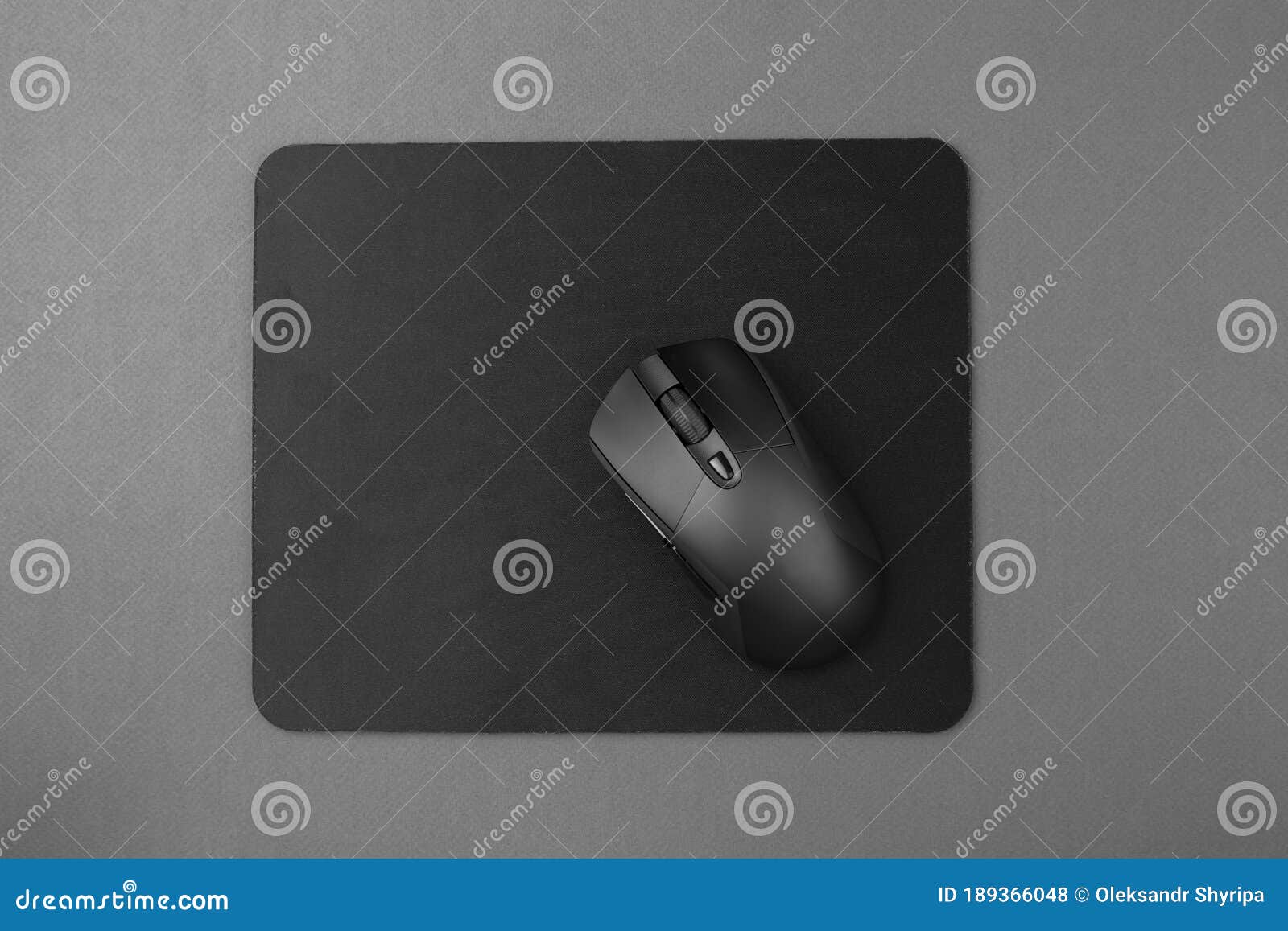 Black Wireless Mouse on a Mouse Pad Stock Photo - Image of internet ...