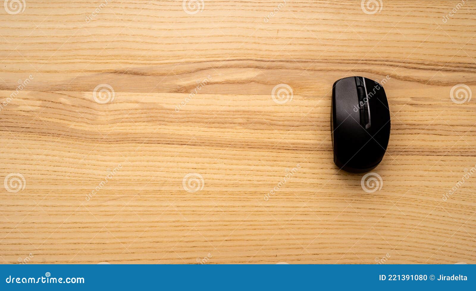 Black Wireless Mouse on Wooden Table with Copyspace Stock Photo - Image ...