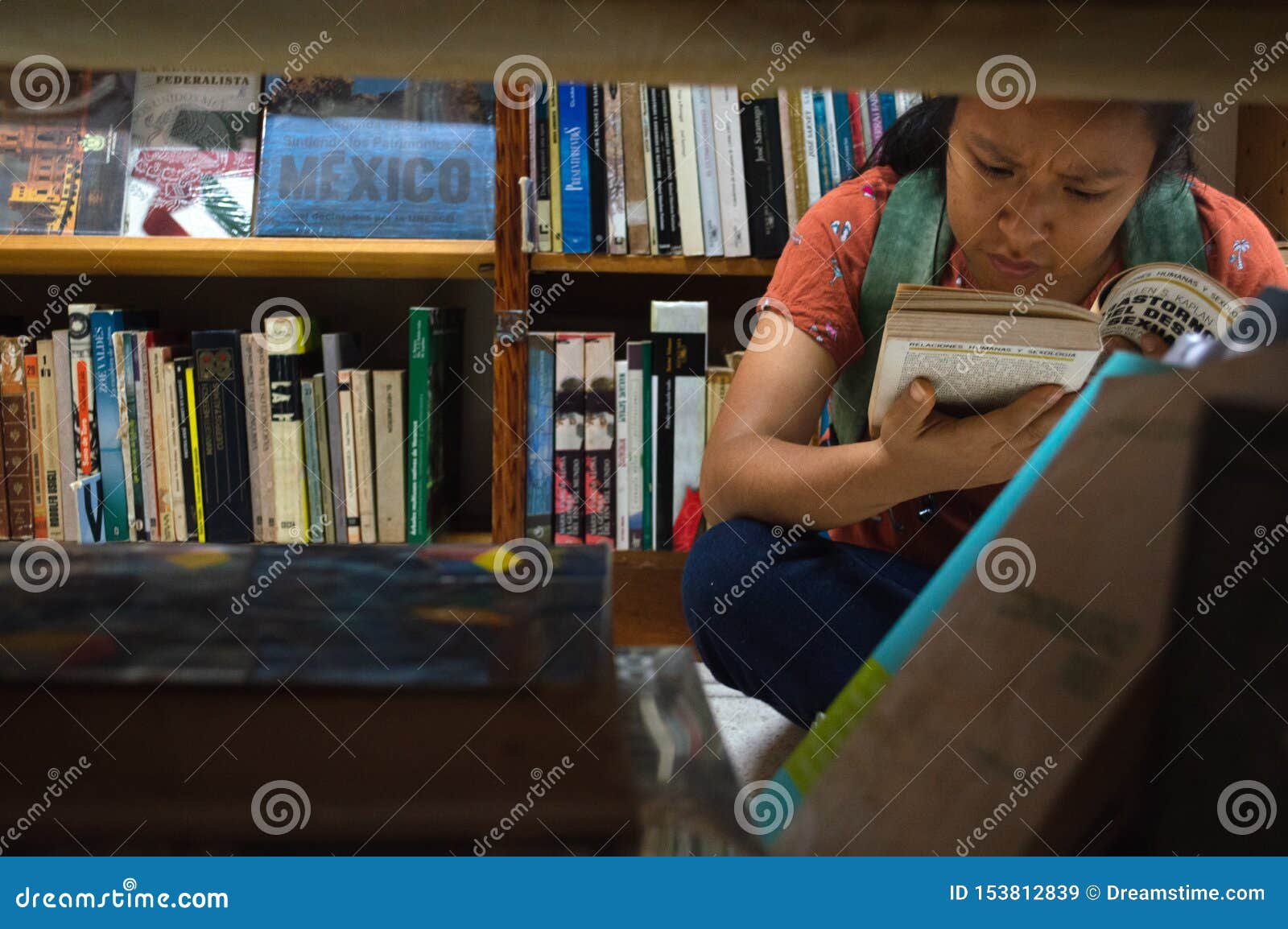 Black Woman with Book in Her Hands in a Library Editorial Stock Image ...
