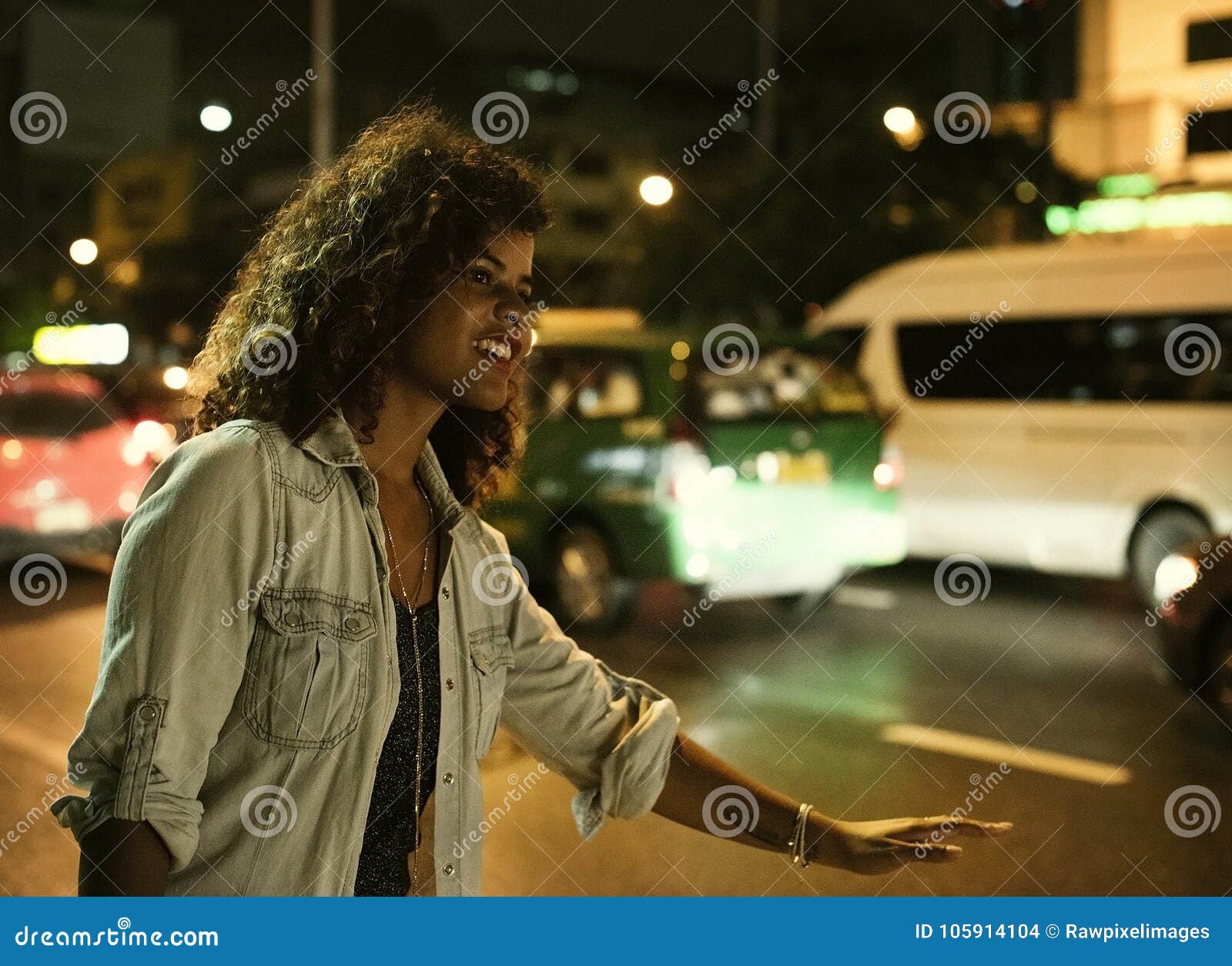 Black woman calling a cab stock photo. Image of waving - 105914104