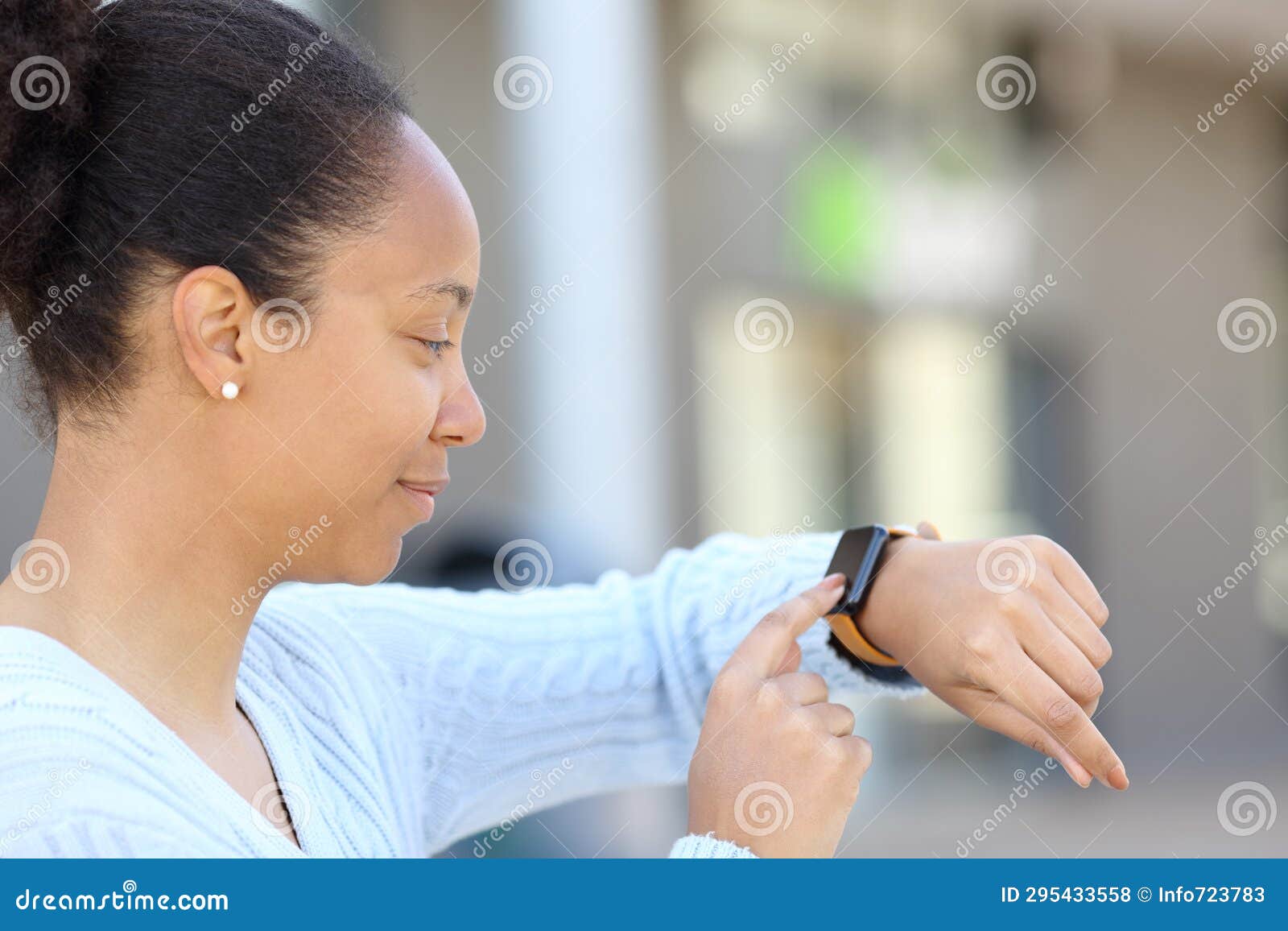 Black Woman Checking Smartwatch Outdoors Stock Photo - Image of time ...