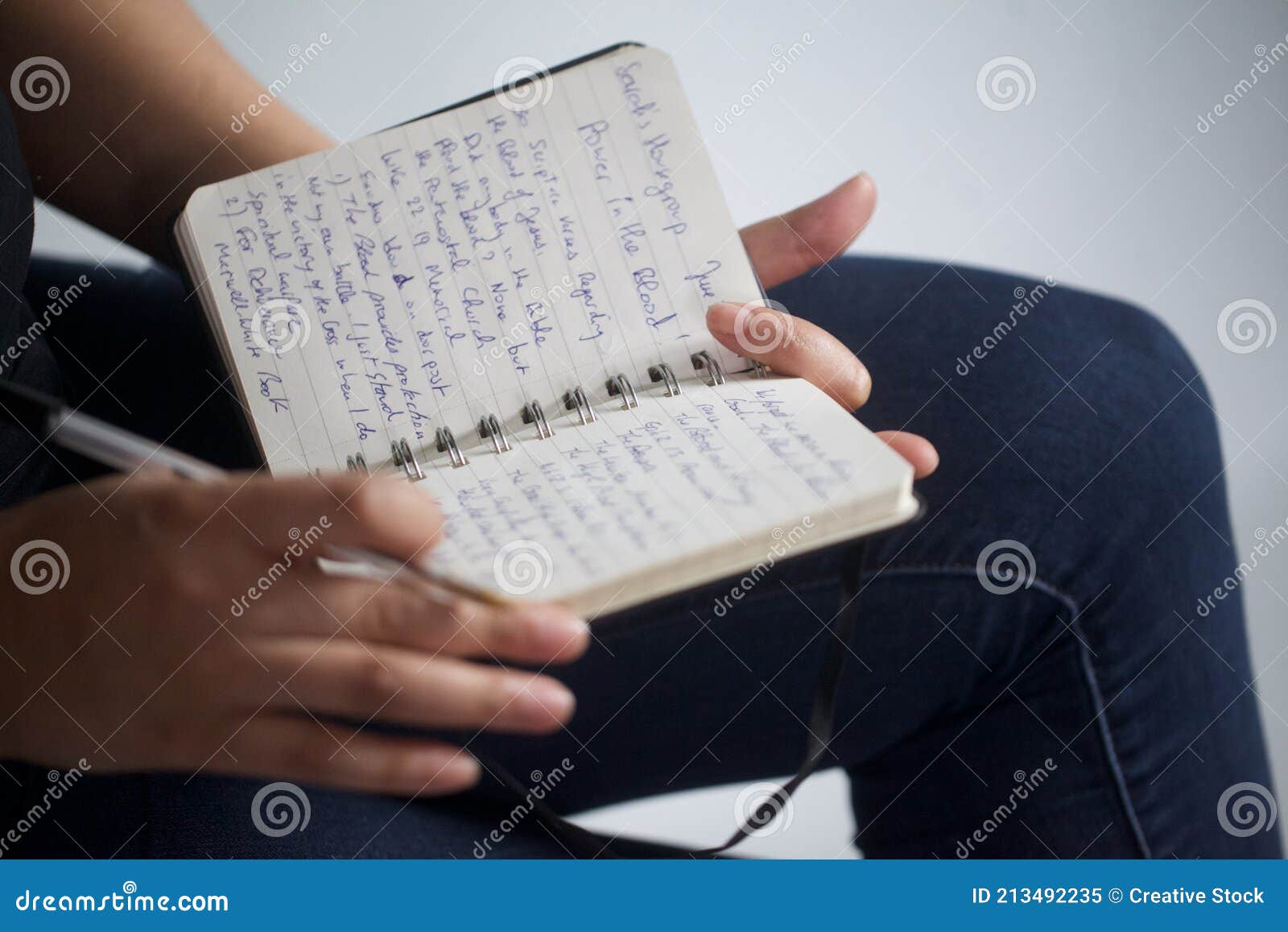 Black Woman Holding a Notebook Stock Image - Image of womans, looking ...