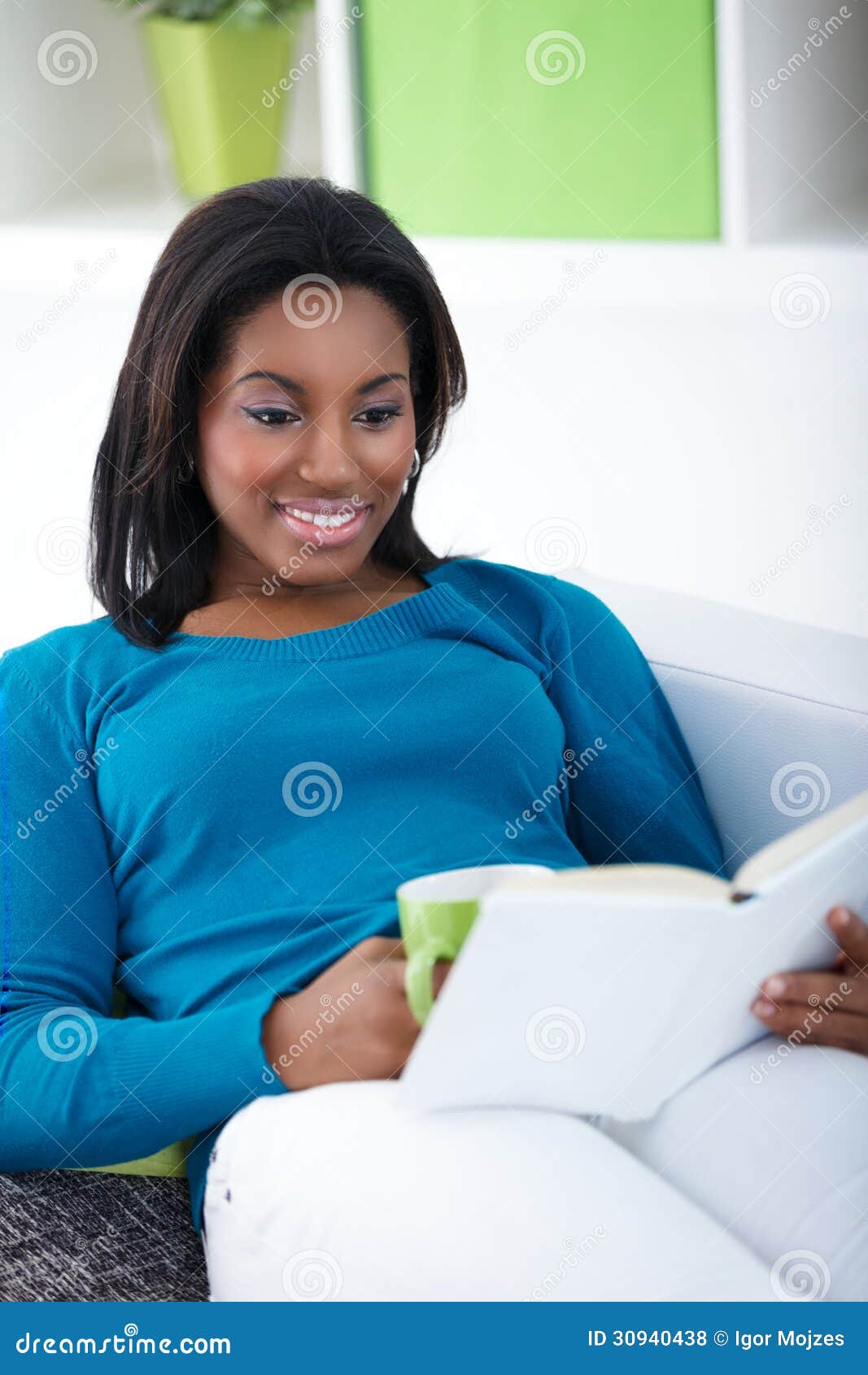 Black woman reading book stock photo. Image of indoor - 30940438
