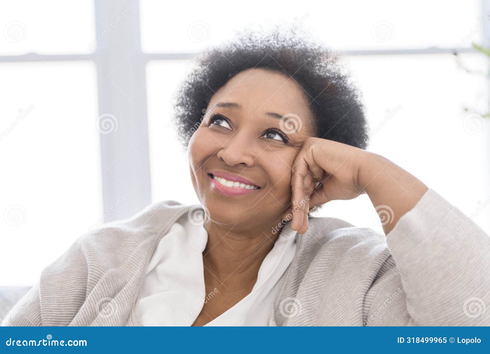 Black Woman Sitting on Sofa at Home Stock Image - Image of woman, hair ...