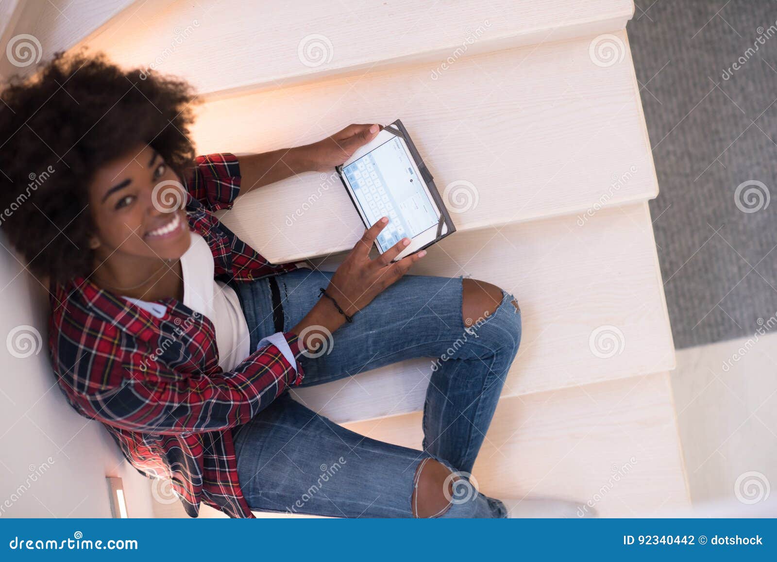 Black Woman Using Her Electronic Tablet Stock Photo - Image of cheerful ...