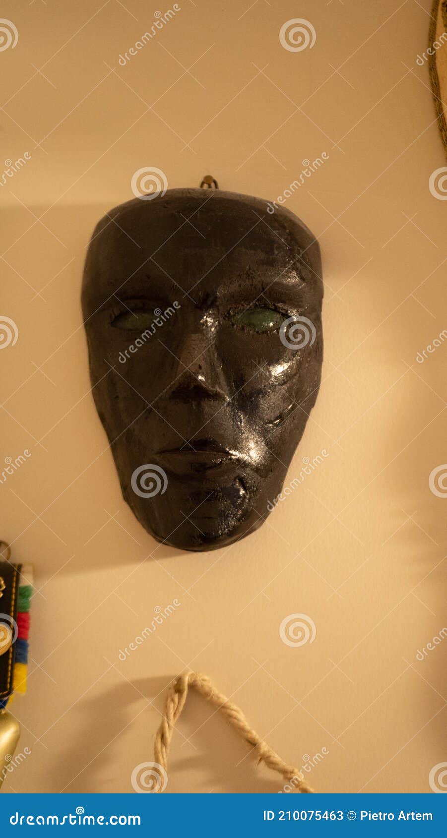 Black Wooden Mask on a Gray Background. Close Up Stock Image - Image of ...