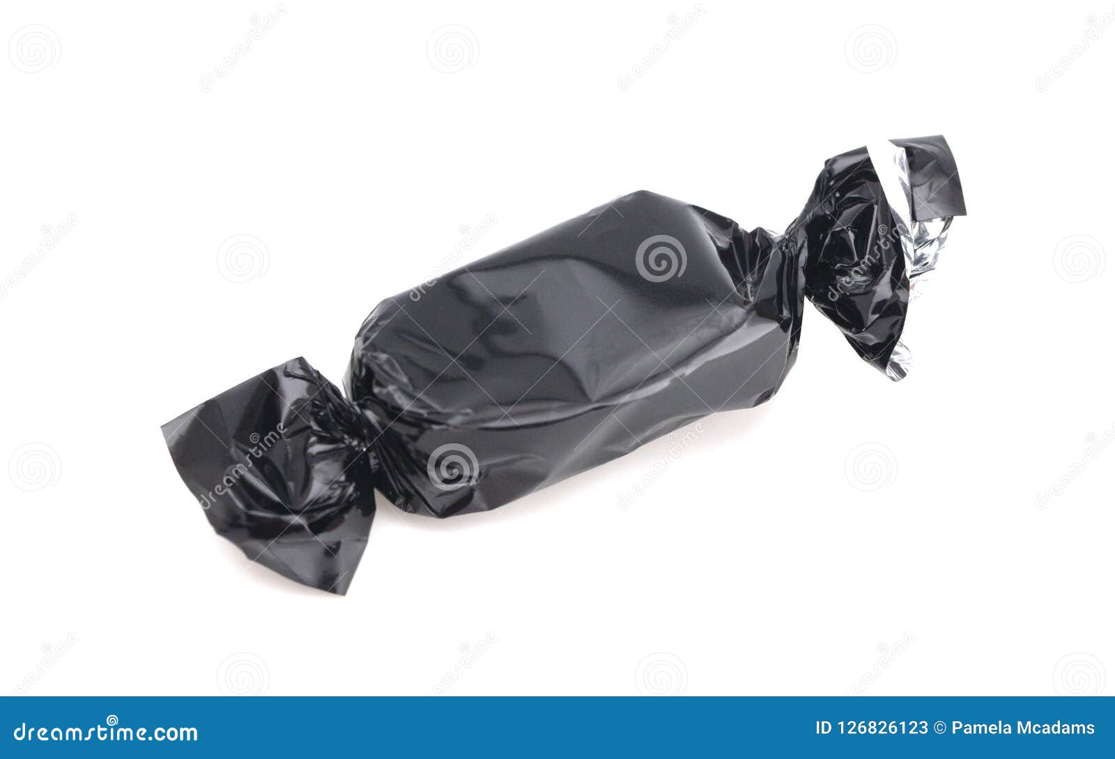 Black Wrapped Candy stock image. Image of toffee, isolated - 126826123