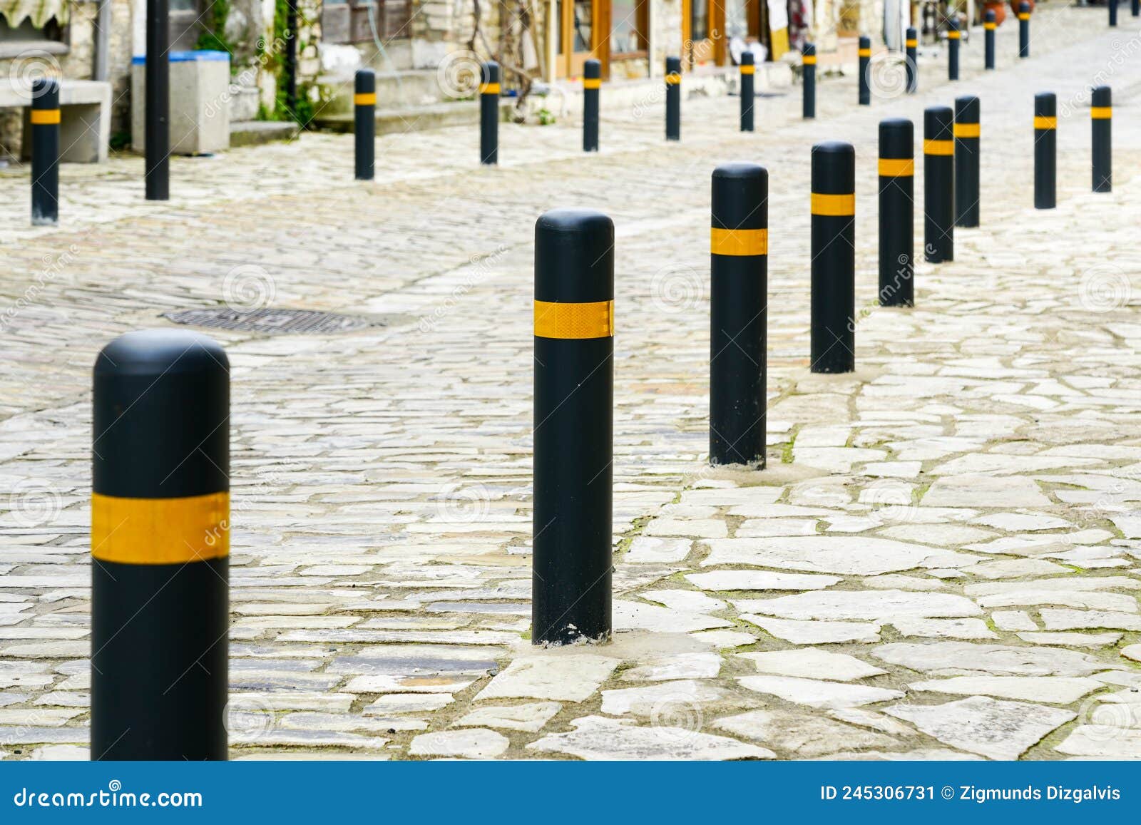 Black and Yellow Colored Columns for Protection the Sidewalk from the ...