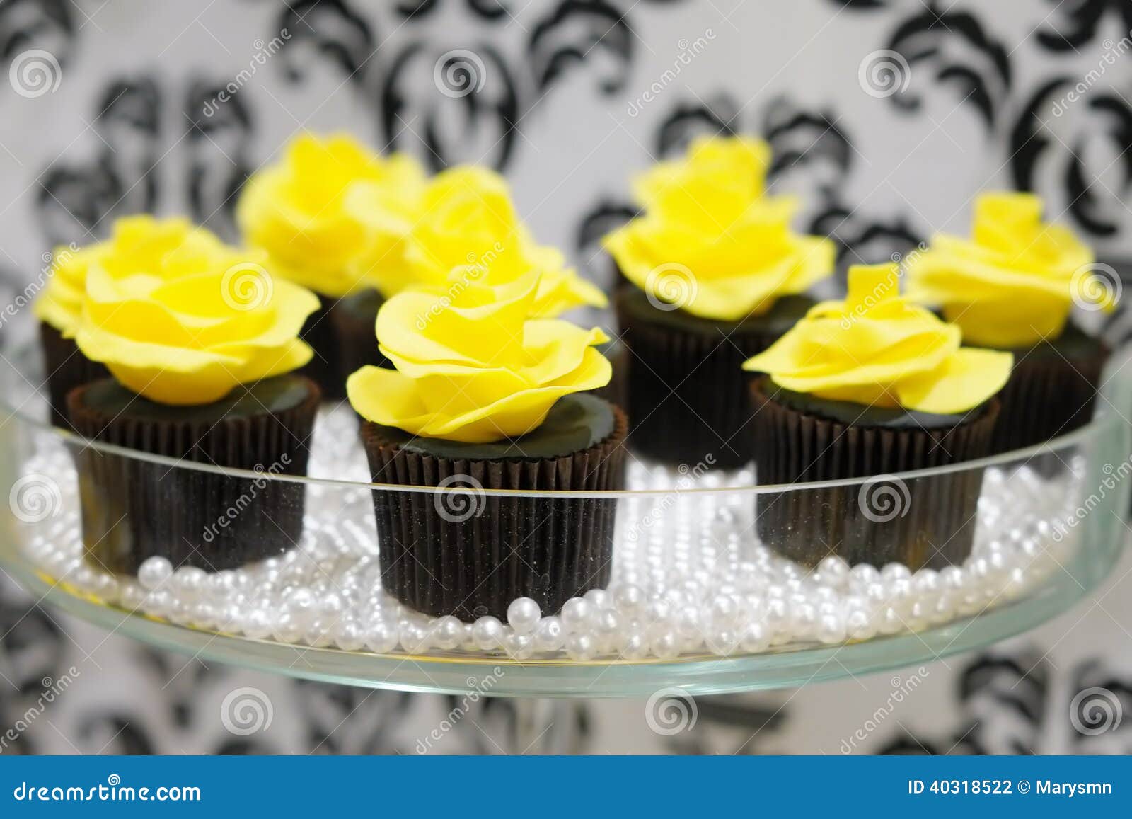 Black and yellow cupcakes stock photo. Image of confectionery - 40318522