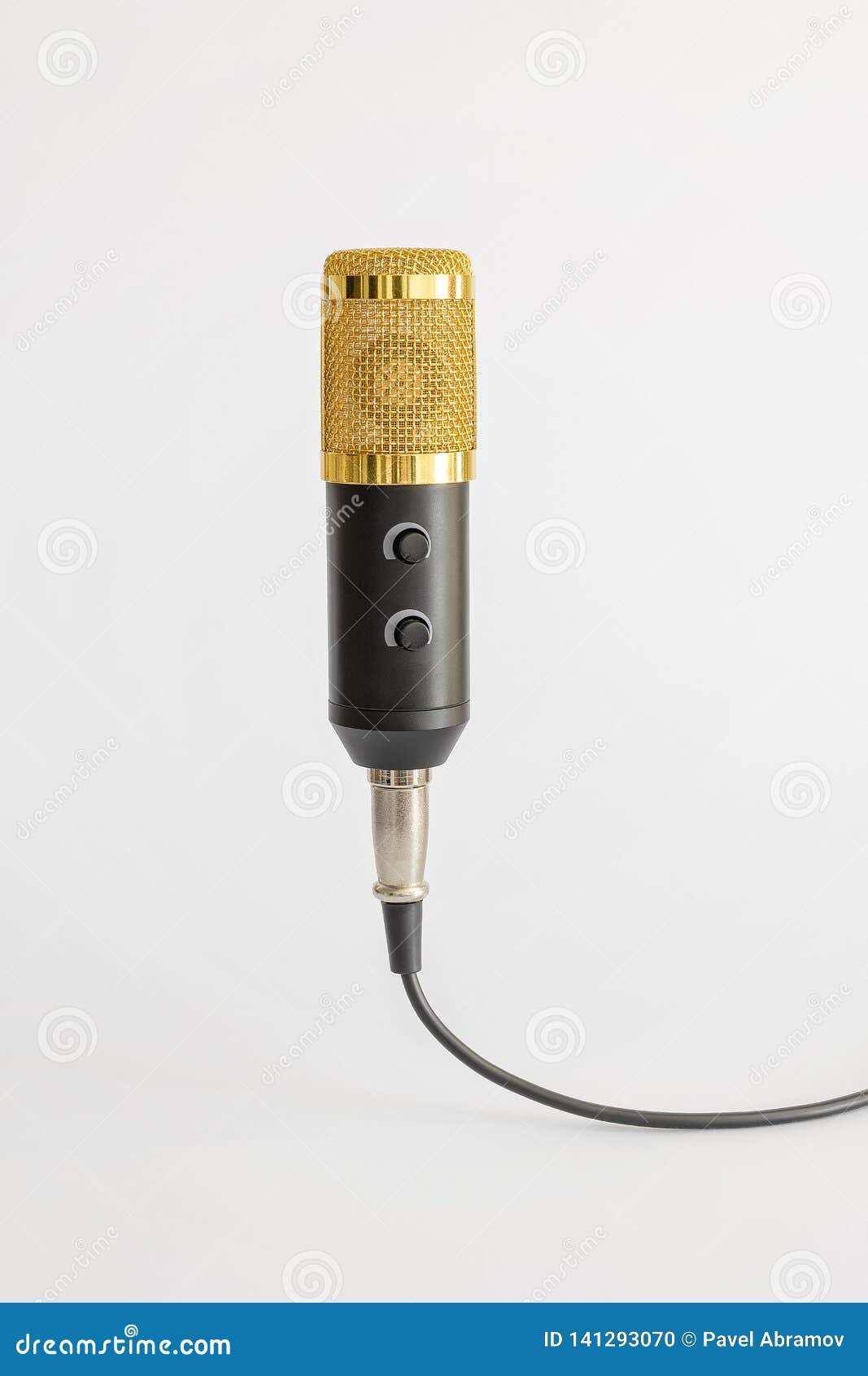 The Black Yellow Microphone with the Wire on a White Background. Copy ...