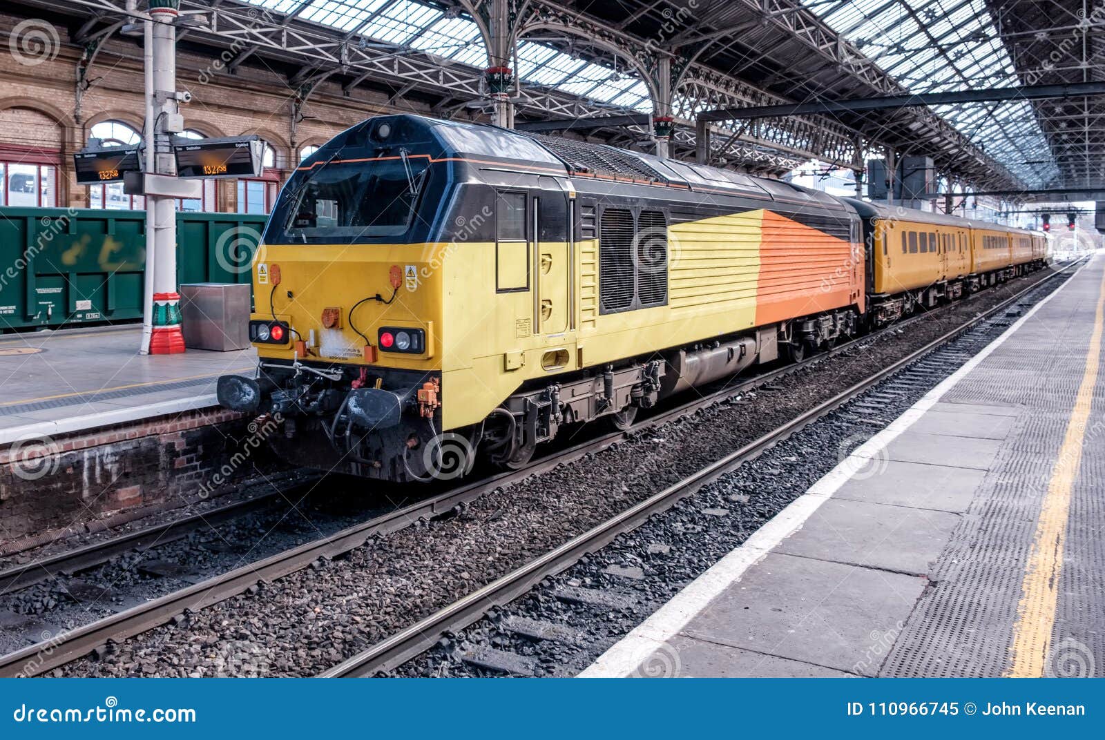 Orange Locomotive On A Railroad Line Stock Photo | CartoonDealer.com ...