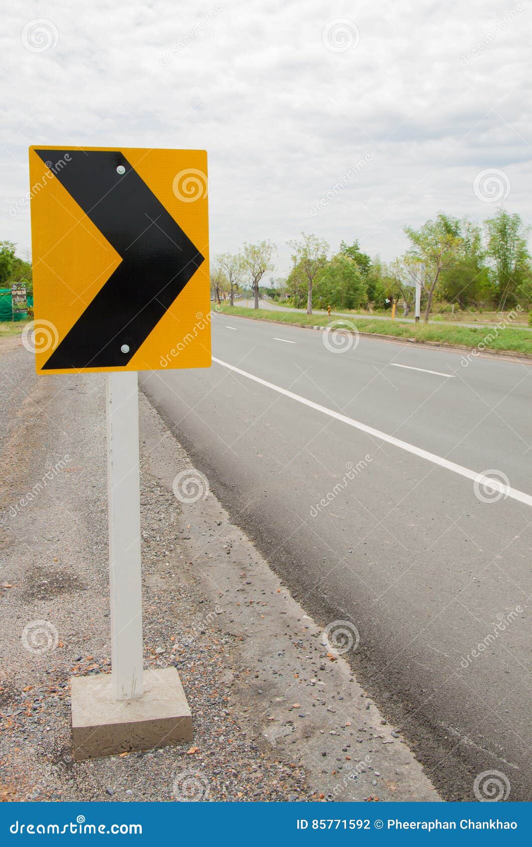 Black and Yellow Traffic Sign at Roadside Stock Photo - Image of ...