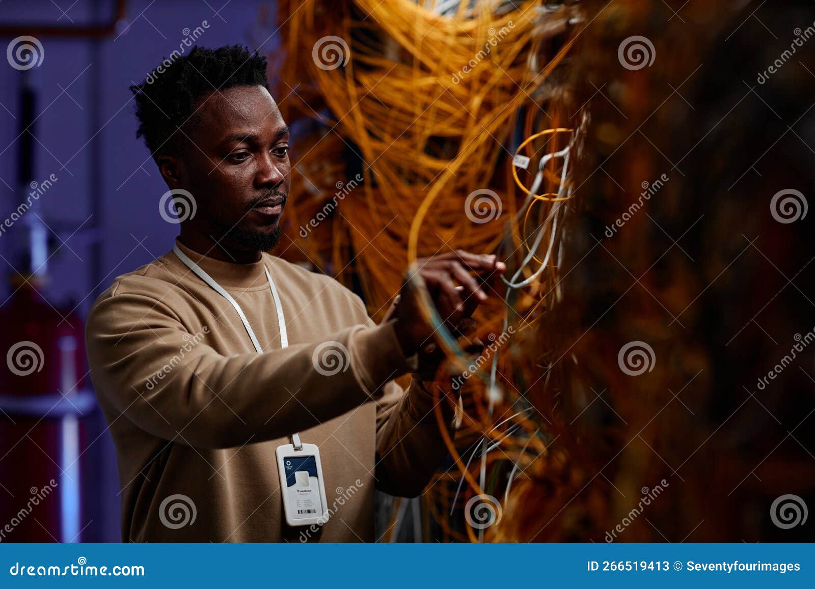 Black Young Man As System Administrator Setting Up Server Network Stock ...