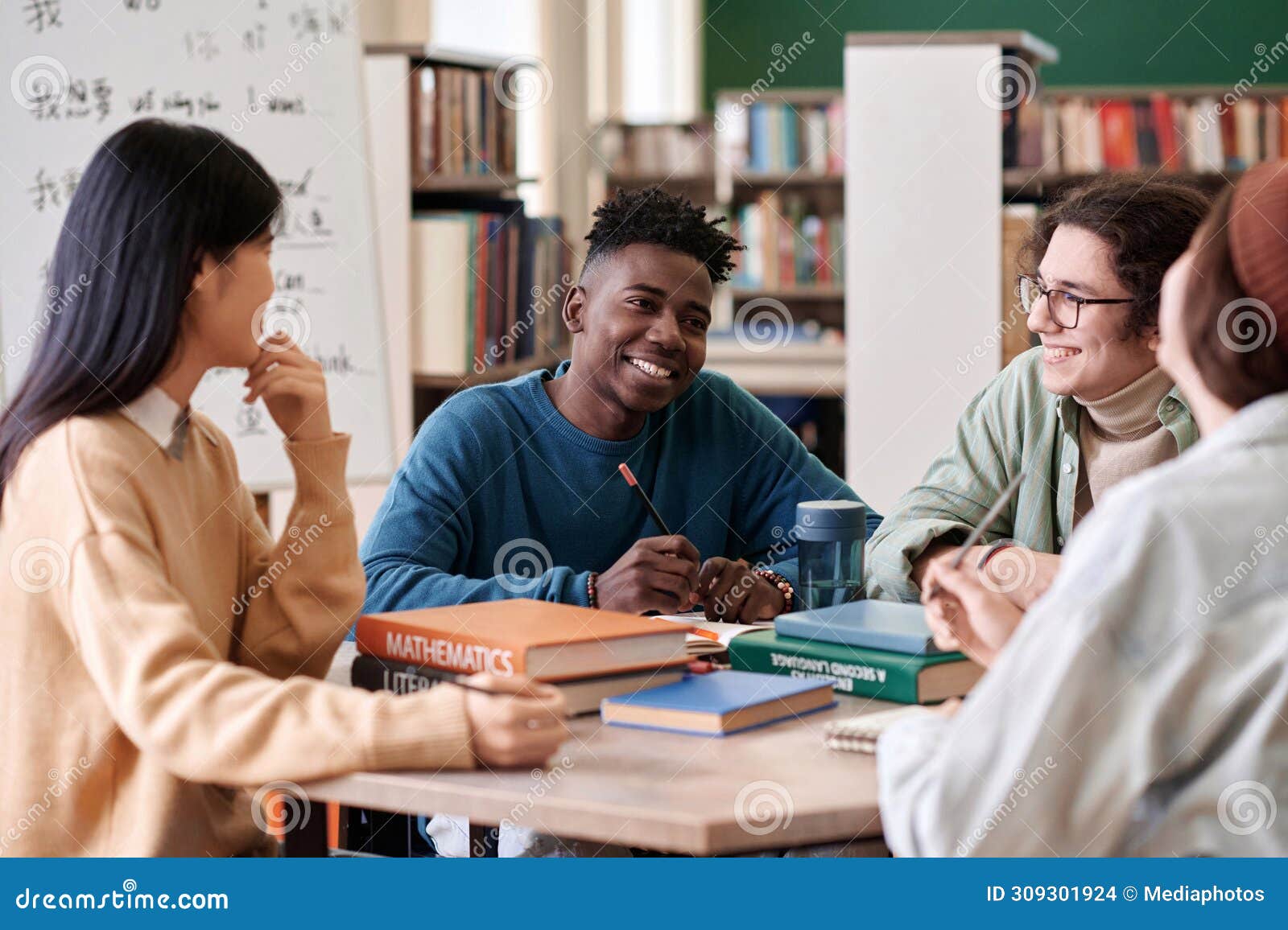 Black Young Man Smiling during Group Discussion Stock Photo - Image of ...