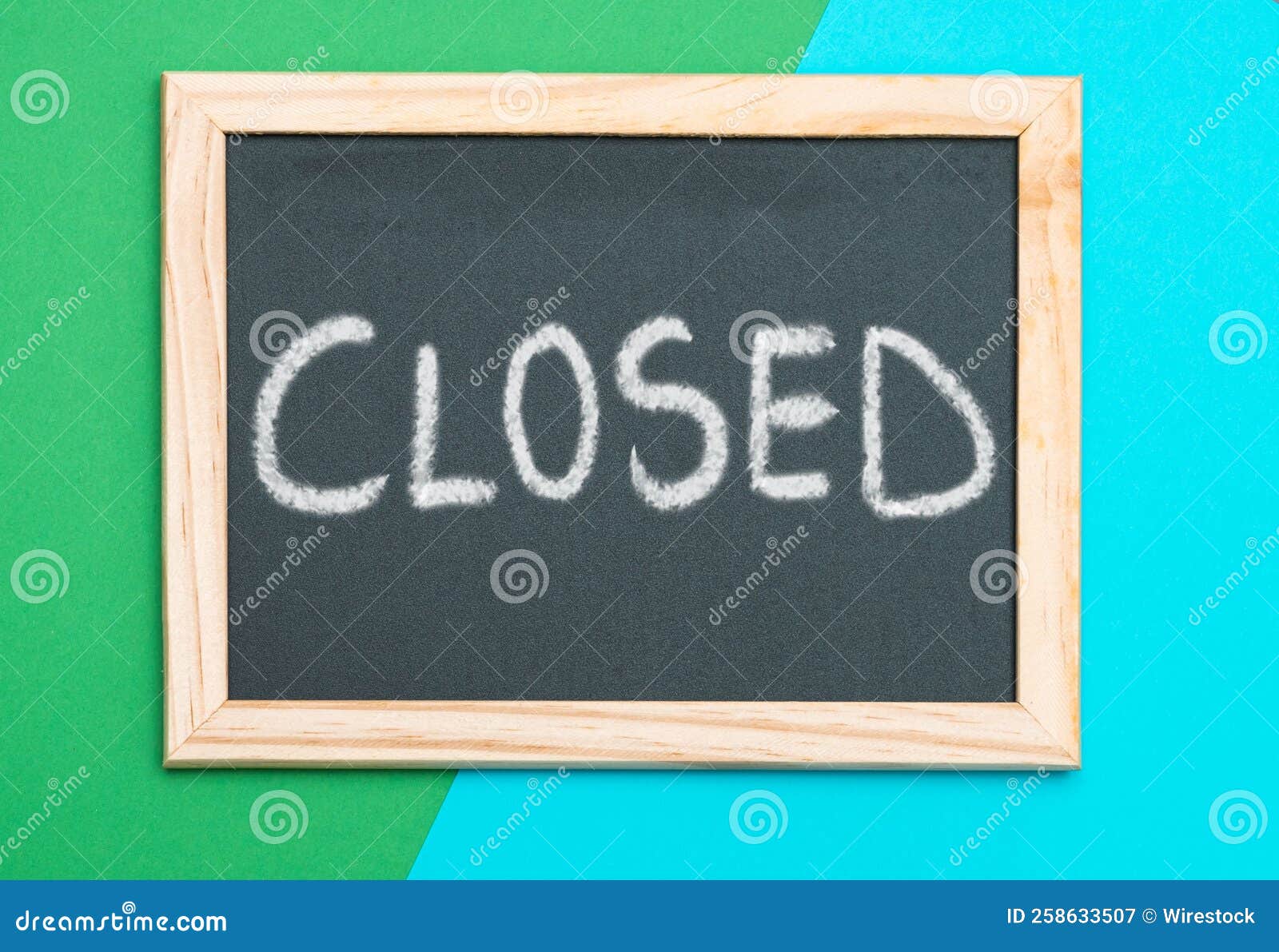 Blackboard with Closed Writing, on a Green and Blue Wall Stock Image ...