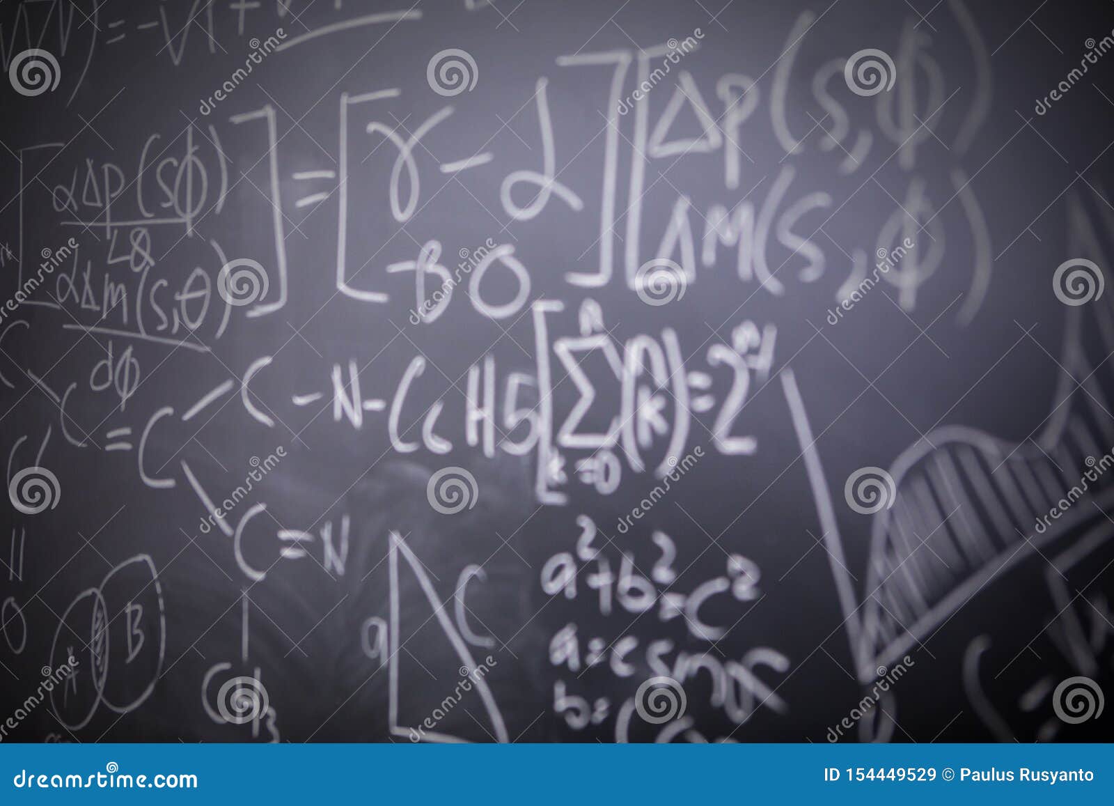 Blackboard Inscribed With Scientific Formulas And Calculations In ...
