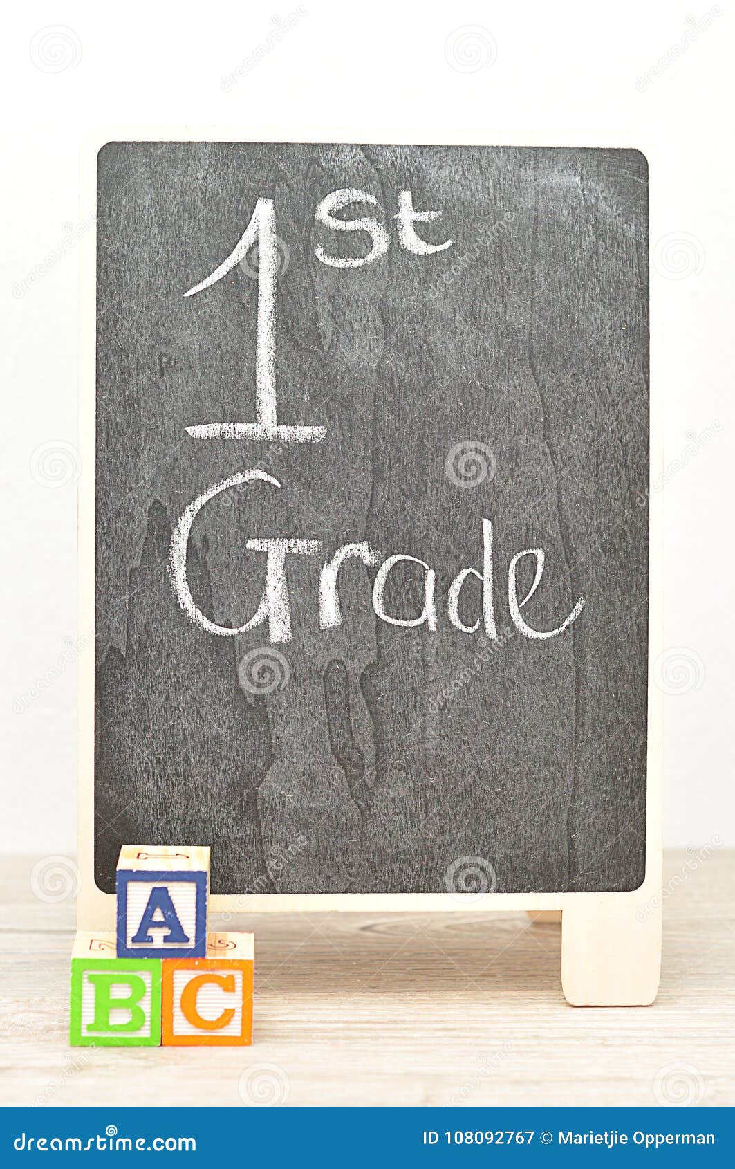 A Blackboard With The Words 1st Grade With Alphabet Blocks Stock Image ...