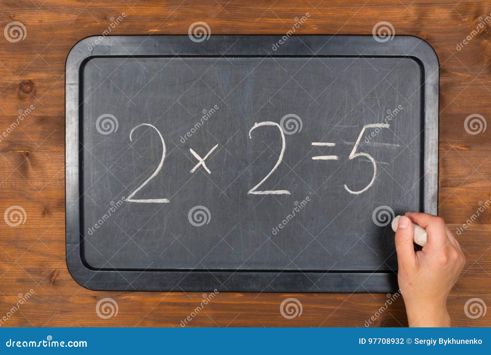 Blackboard with Wrong Maths Equation and Chalk in Hand Stock Photo ...