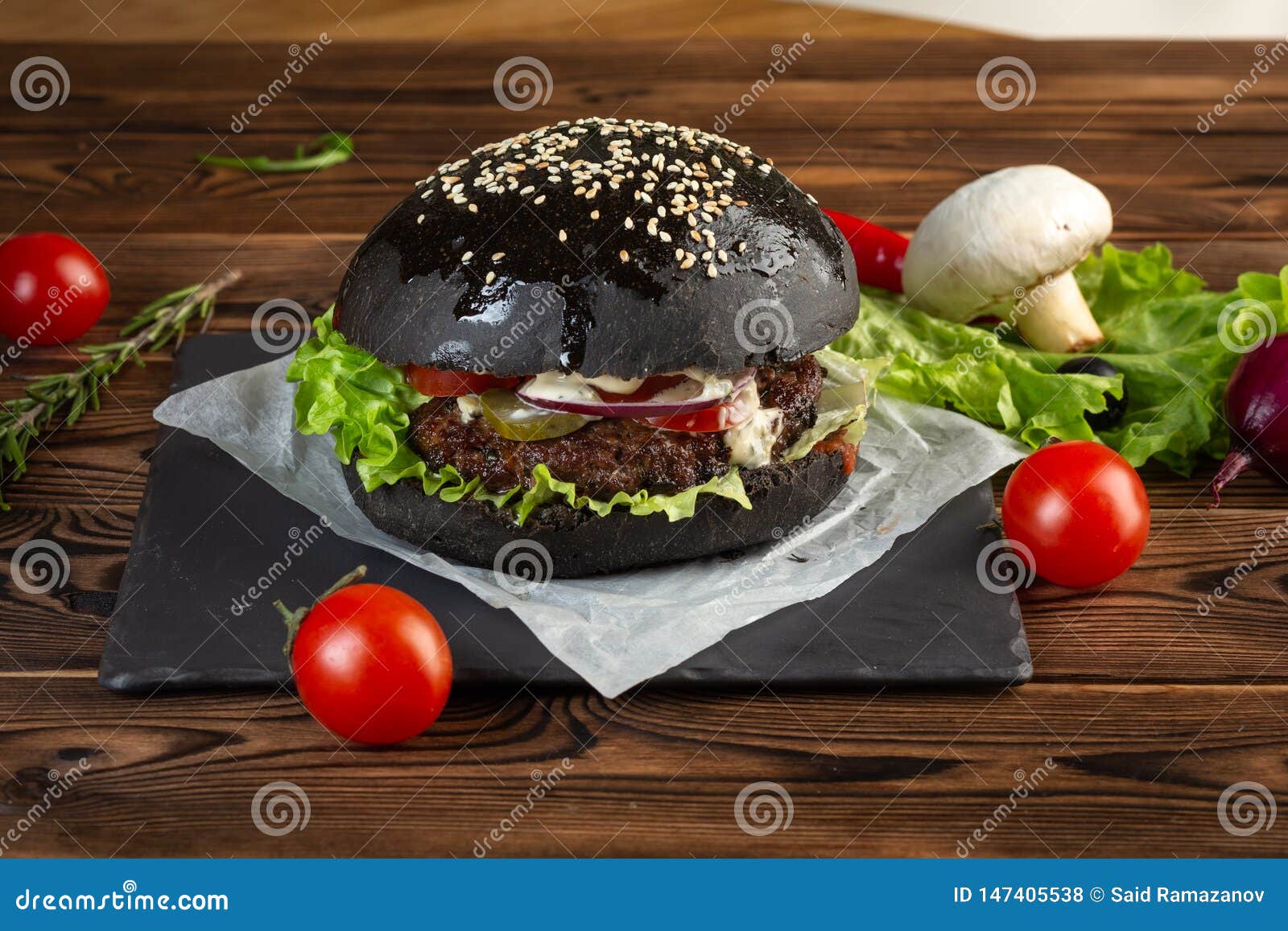 Blackburger Black Mamba with Marbled Beef a Gray Stone Stock Photo ...