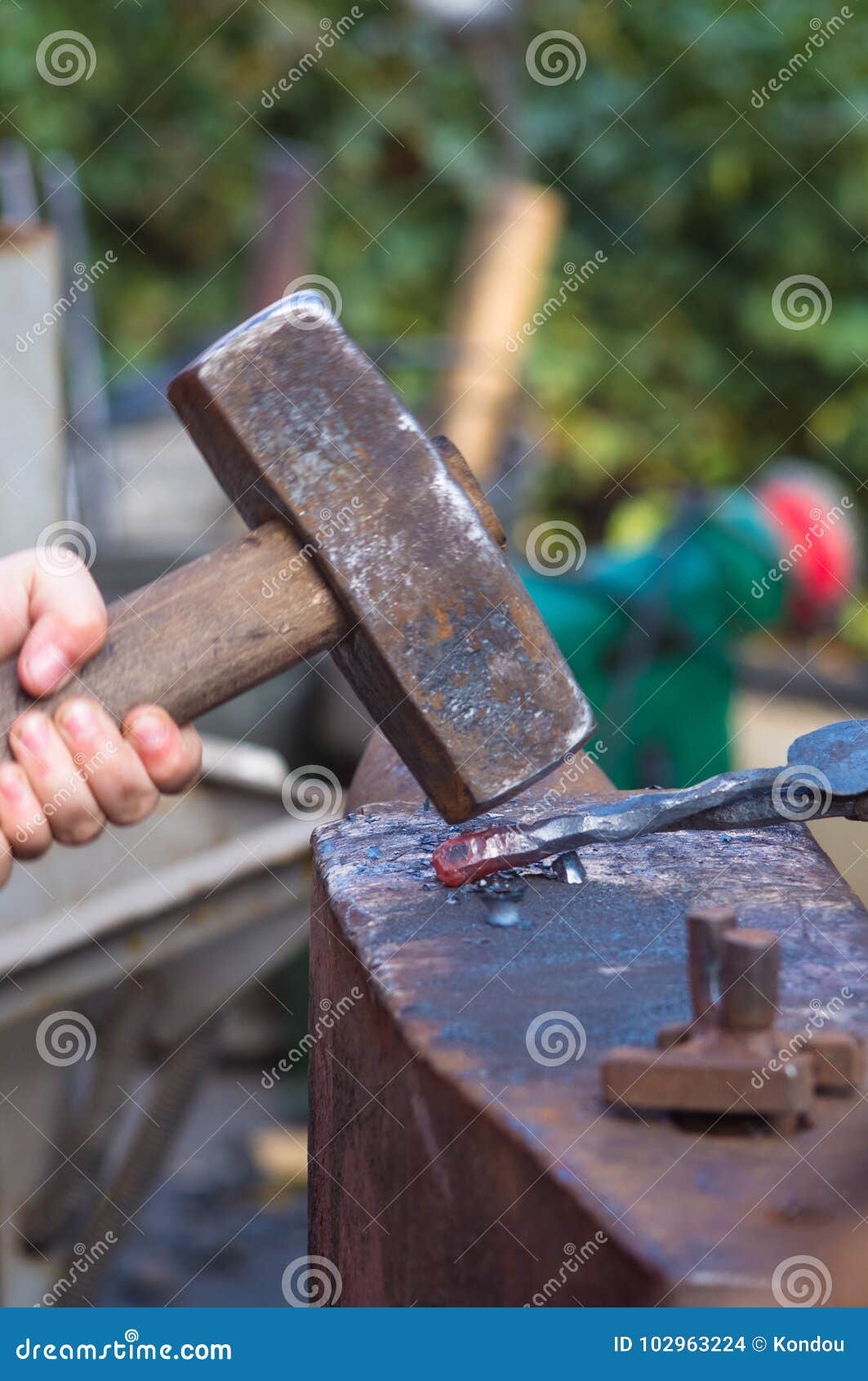 Blacksmith and Apprentice Working on the Anvil Stock Photo - Image of ...