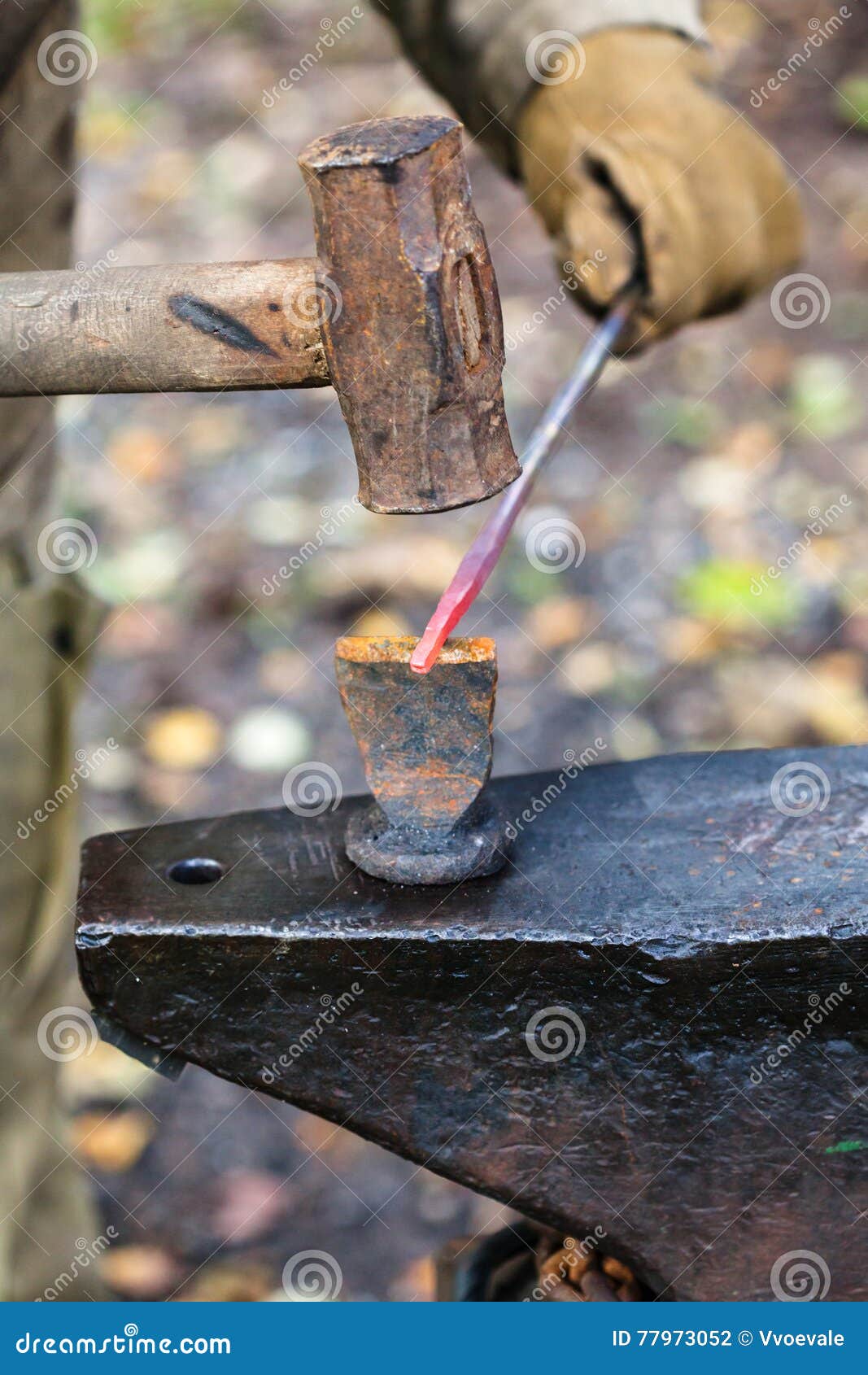 Blacksmith Chops Iron Rod with Hammer and Chisel Stock Photo - Image of ...