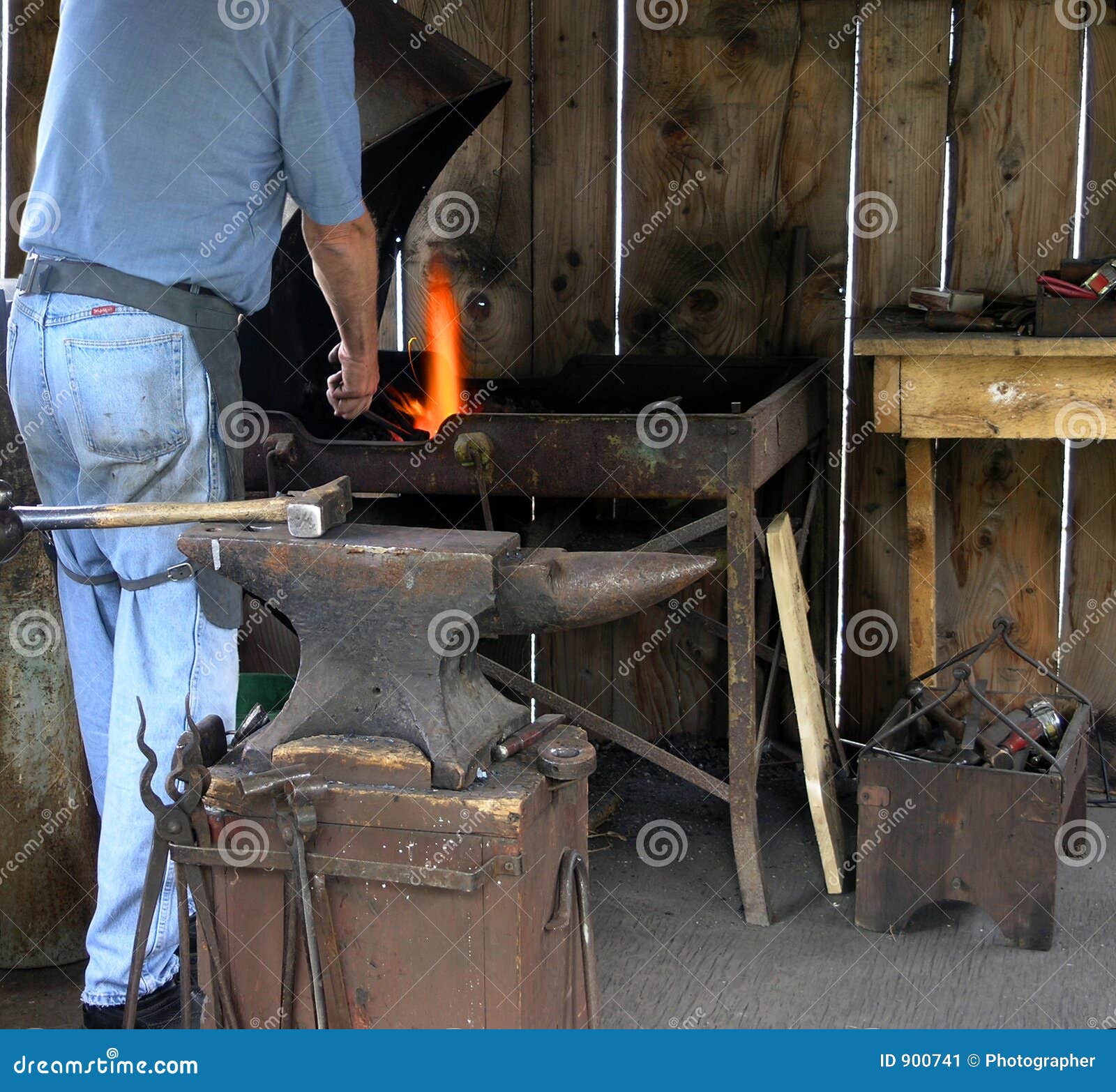 Blacksmith at the Forge stock image. Image of forge, people - 900741