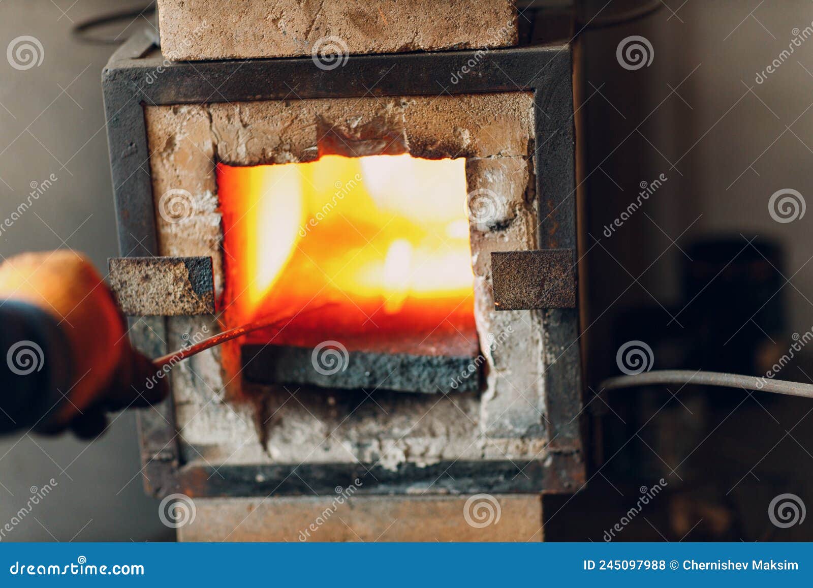 Blacksmith Forge Oven with Hot Flame. Smith Heating Iron Piece of Steel ...