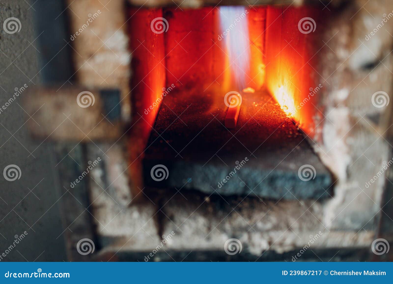 Blacksmith Forge Oven with Hot Flame. Smith Heating Iron Piece of Steel ...