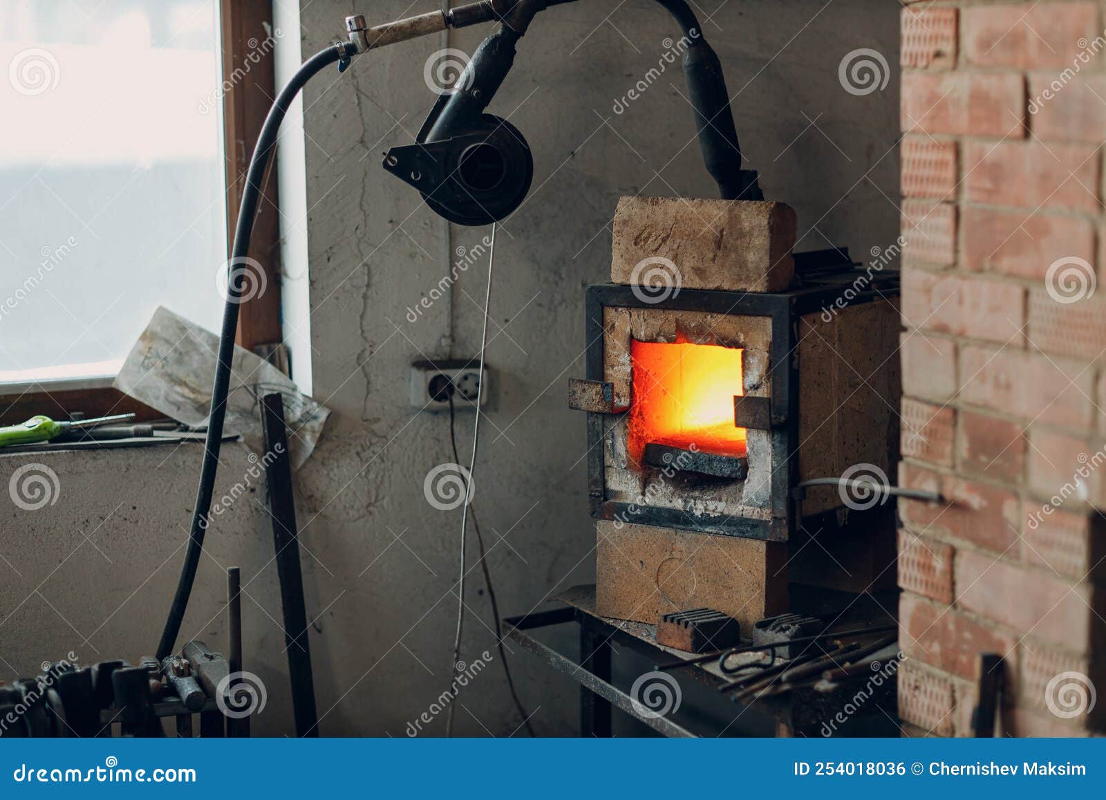 Blacksmith Forge Oven with Hot Flame. Smith Heating Iron Piece of Steel ...